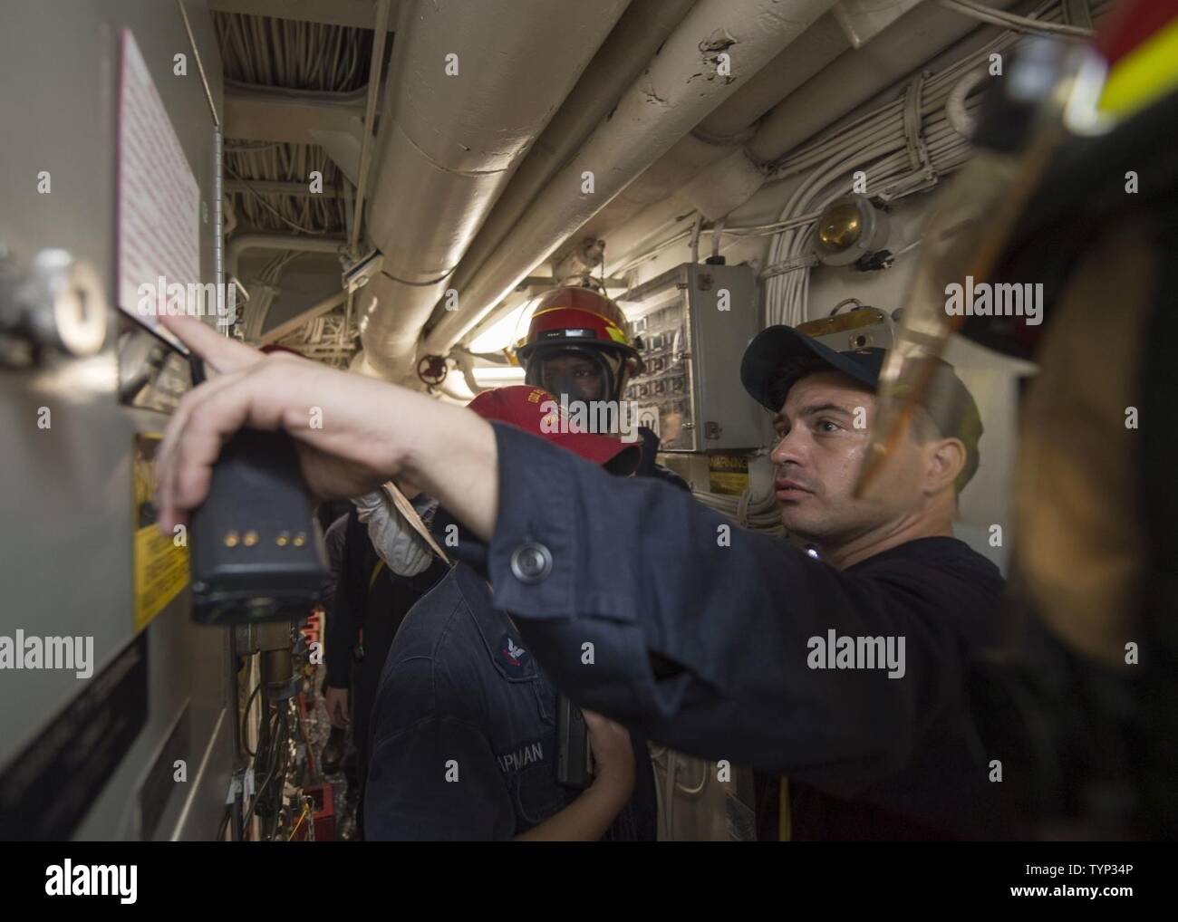 SEA (Nov. 19, 2016) Sailors participate in a damage control drill in a ...