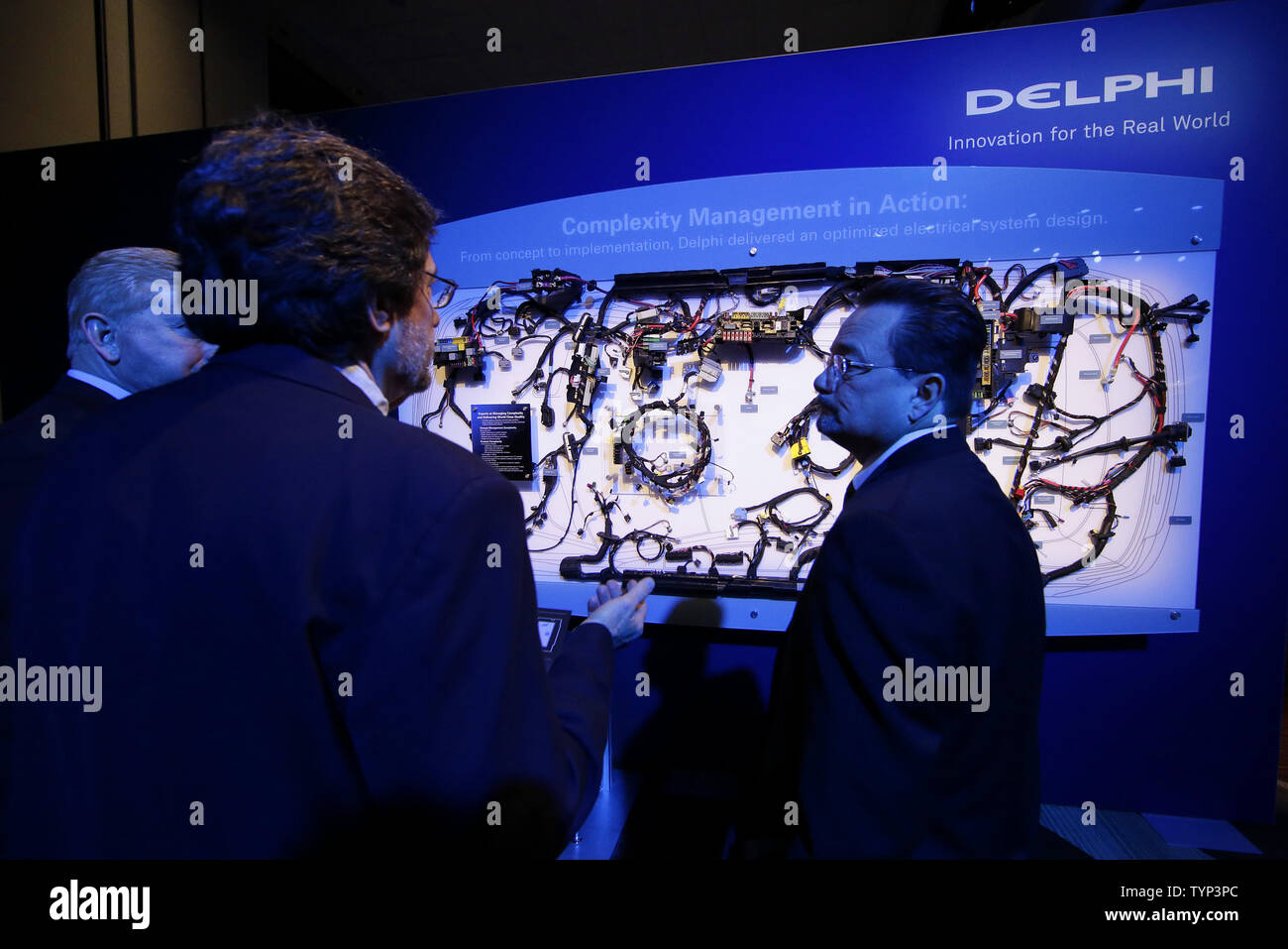 Attendees get a tour of car electrical system designs when Delphi ...