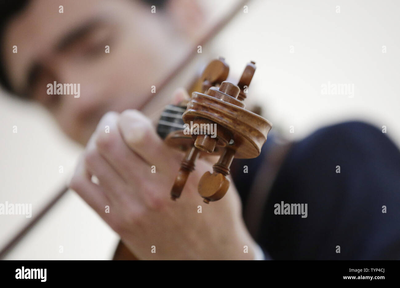 Violist David Aaron Carpenter performs a piece on the Antonio ...