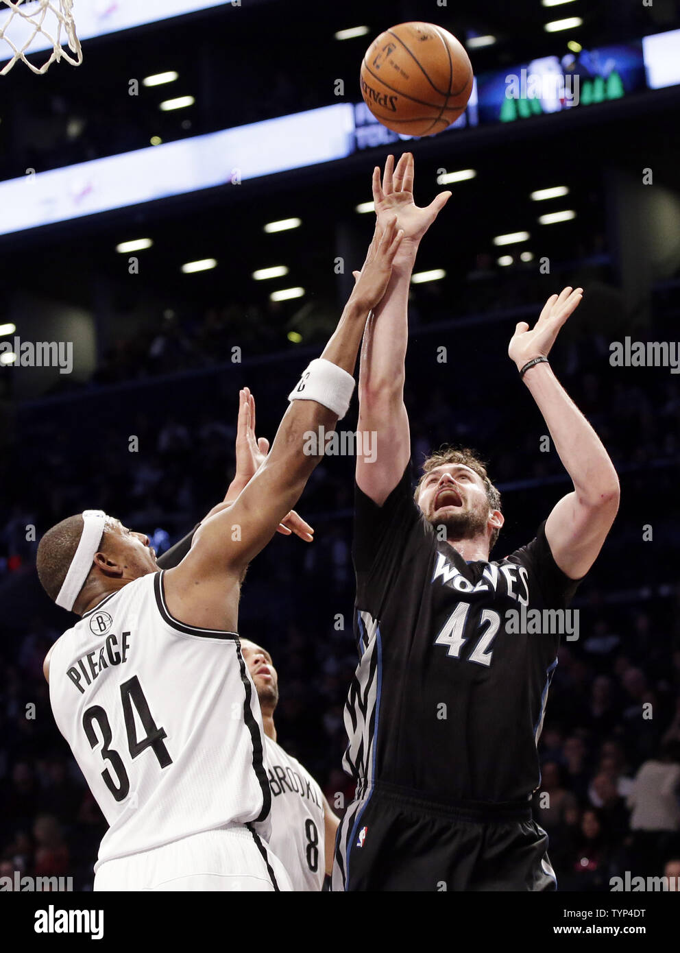 Brooklyn Nets Paul Pierce defends Minnesota Timberwolves Kevin Love who ...