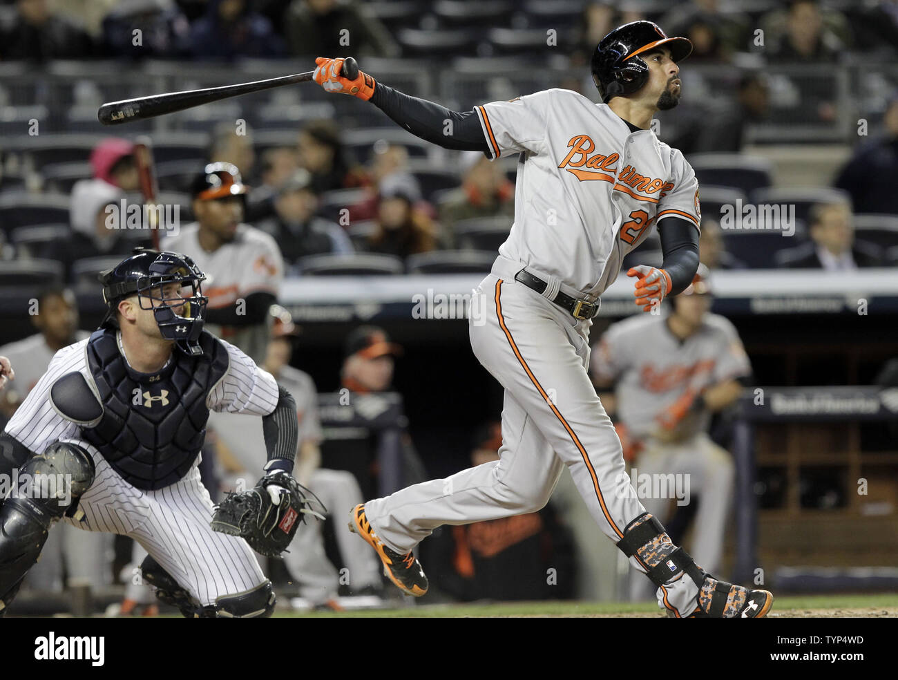 Baltimore Orioles Nick Markakis hits an RBI single in the 9th inning ...