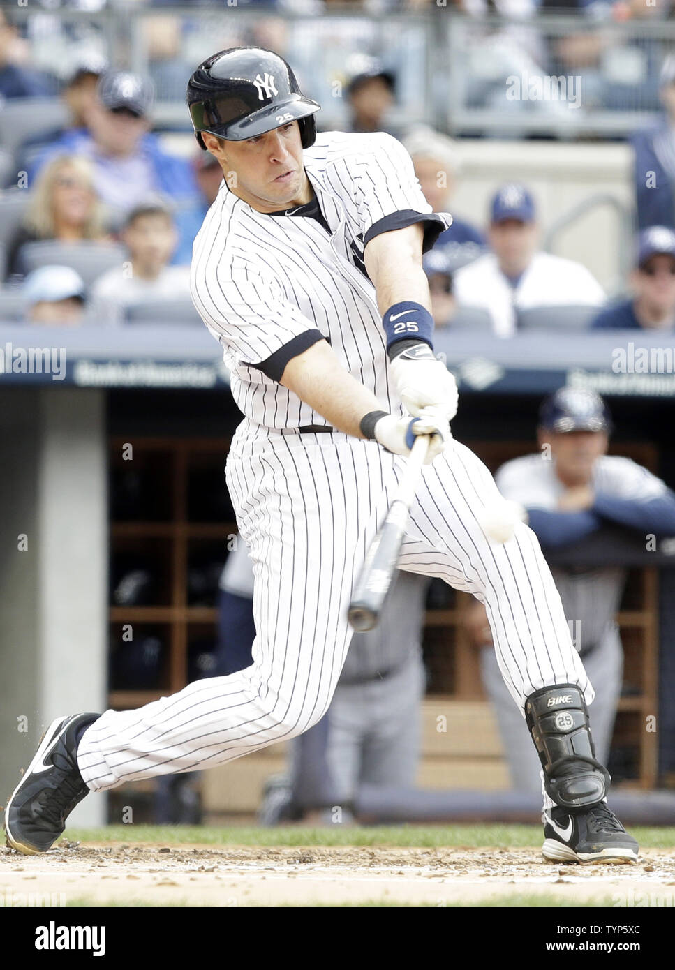 New York Yankees Mark Teixeira hits a single in the 2nd inning against ...