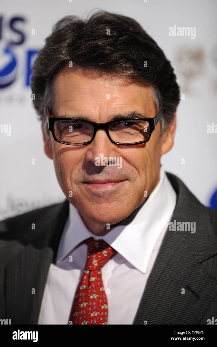 Texas Governor Rick Perry arrives at the Second Annual Champions of ...