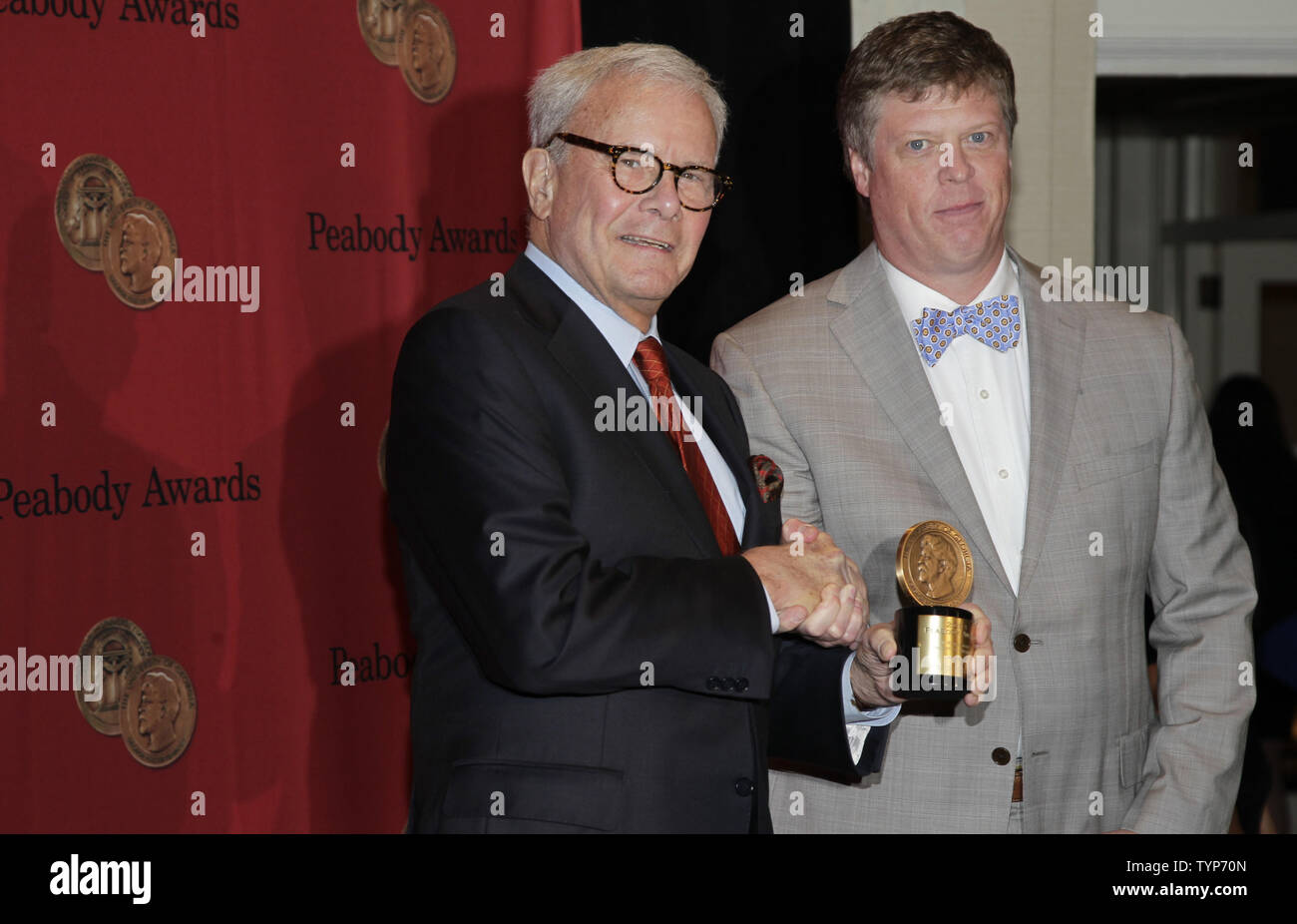 Tom Brokaw arrives on the red carpet at the 73rd Annual Peabody Awards ...