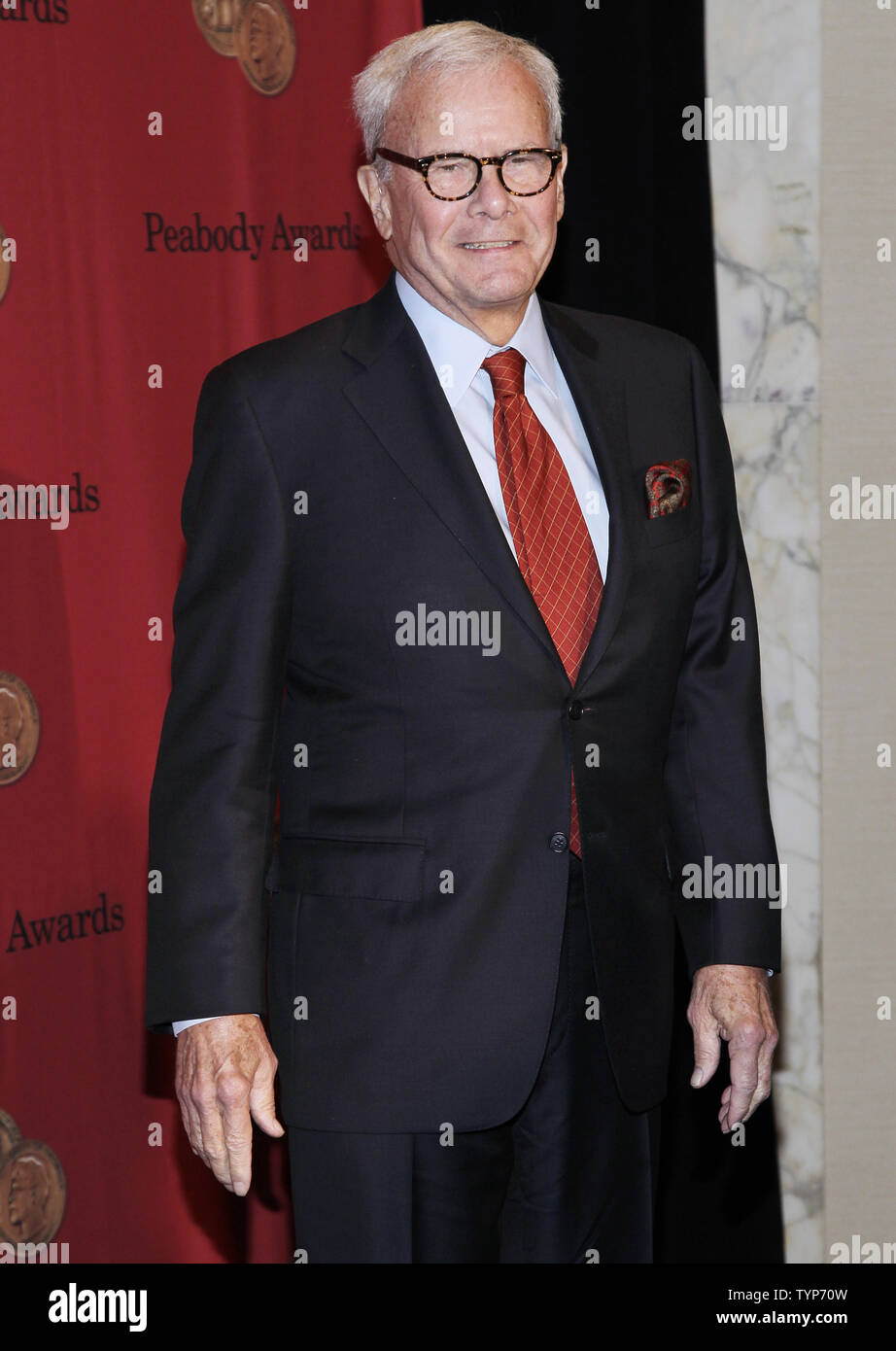 Tom Brokaw arrives on the red carpet at the 73rd Annual Peabody Awards ...