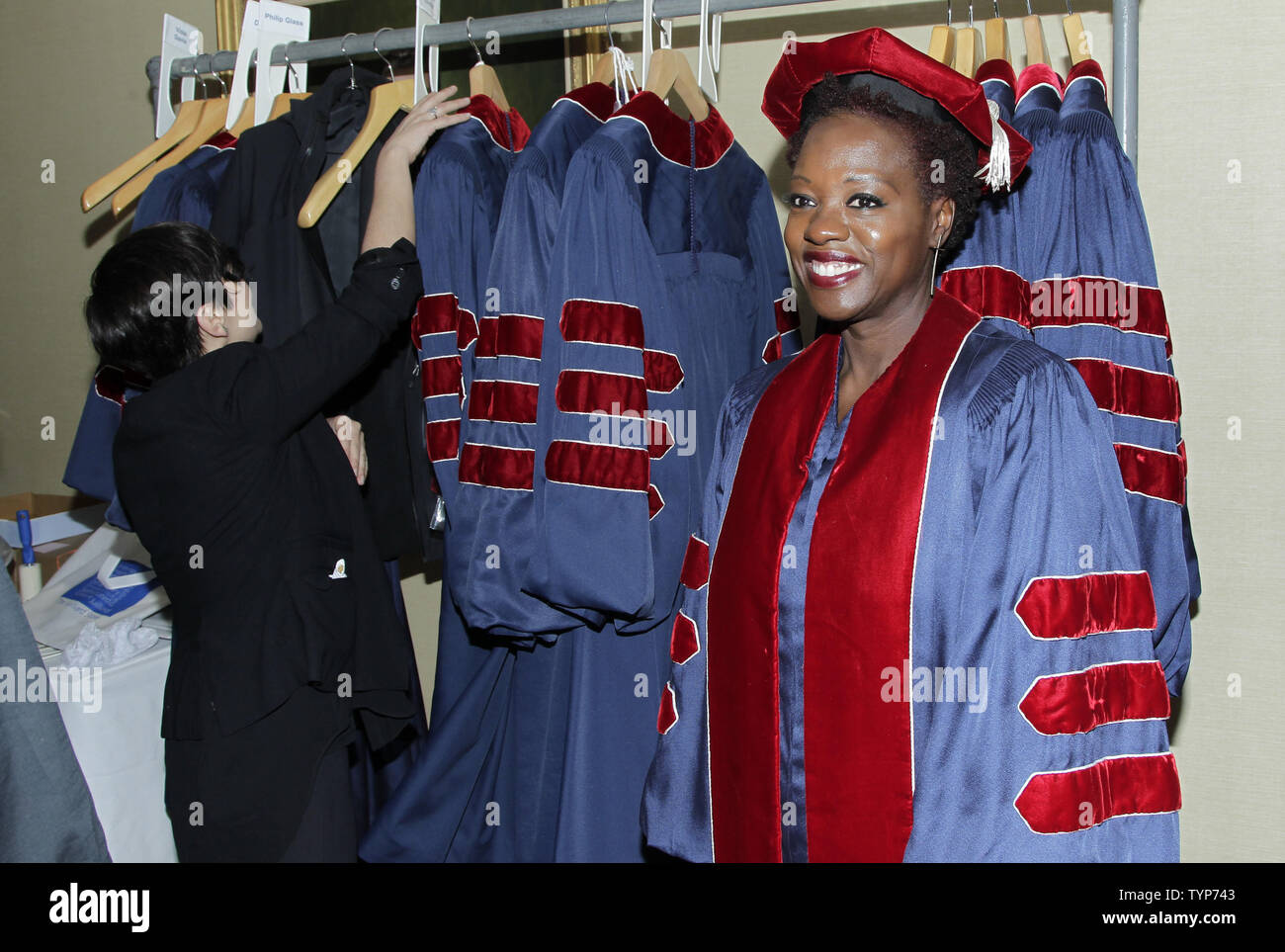 Actress Viola Davis puts on a cap and gown before she receives an ...
