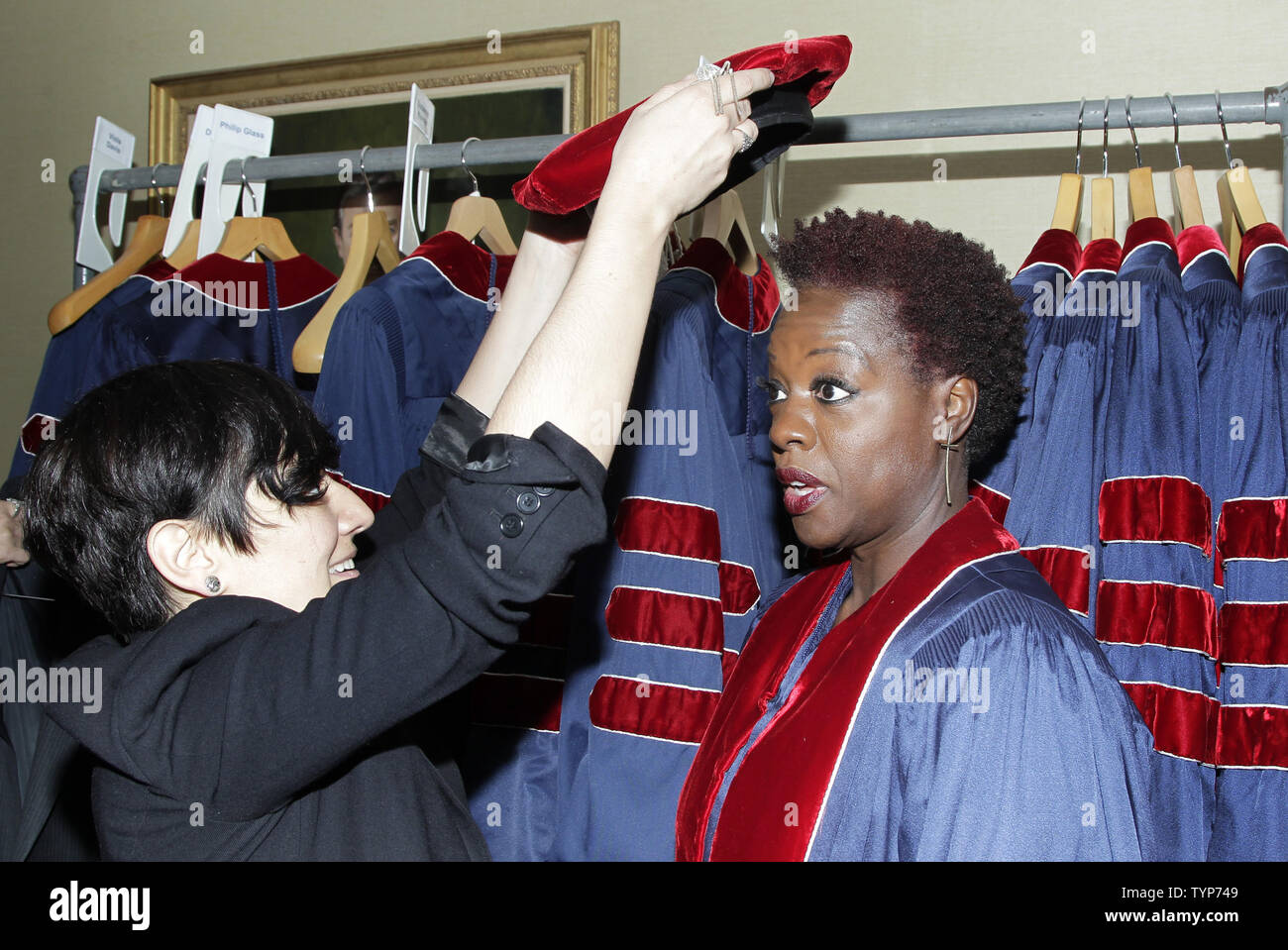 Actress Viola Davis puts on a cap and gown before she receives an ...