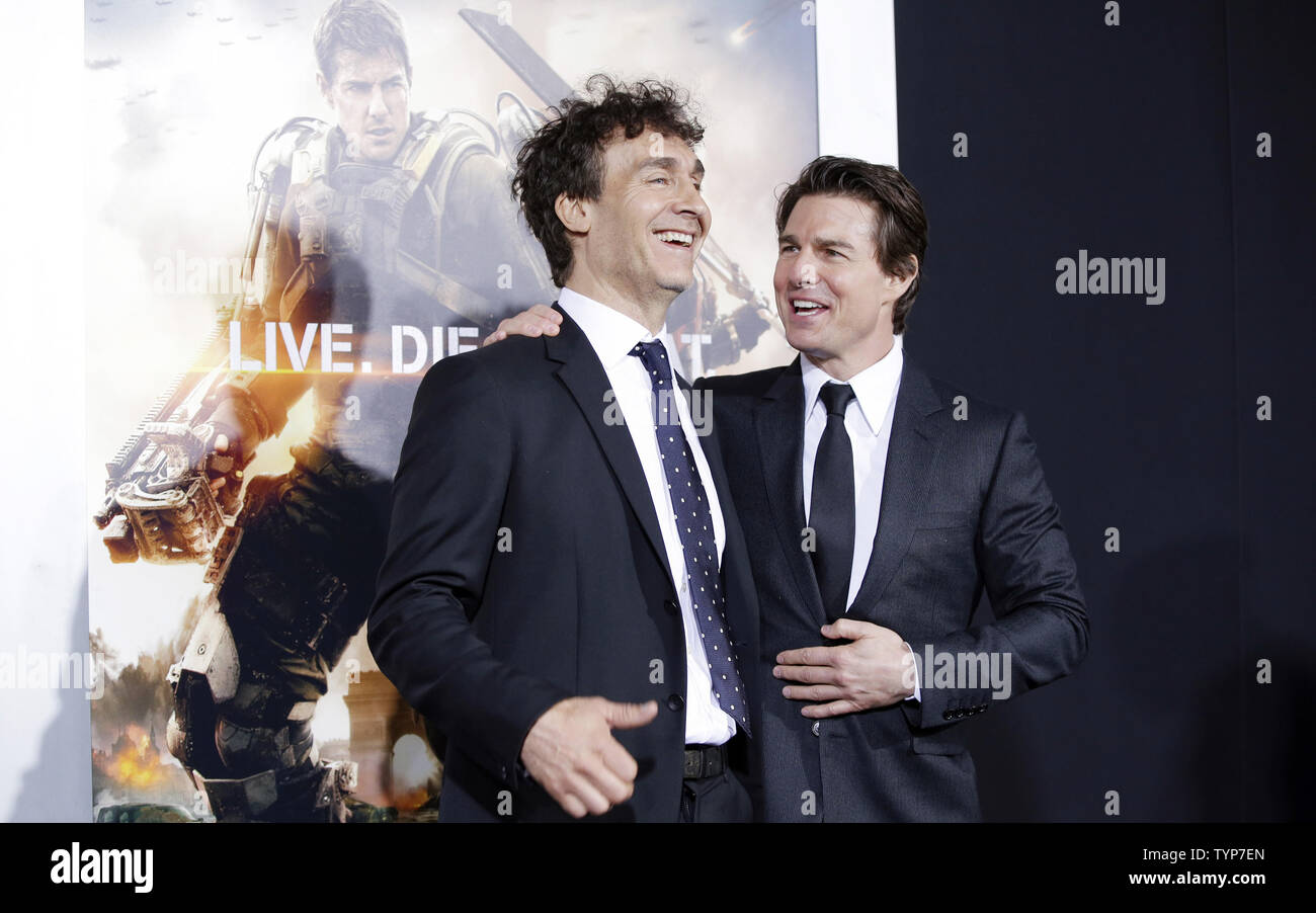 Doug Liman and Tom Cruise arrive on the red carpet at the New York Fan ...