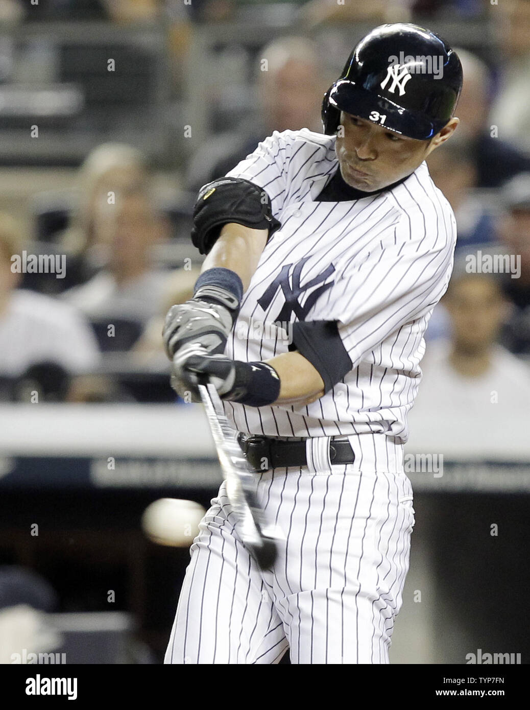 New York Yankees Ichiro Suzuki hits an infield single in the sixth ...