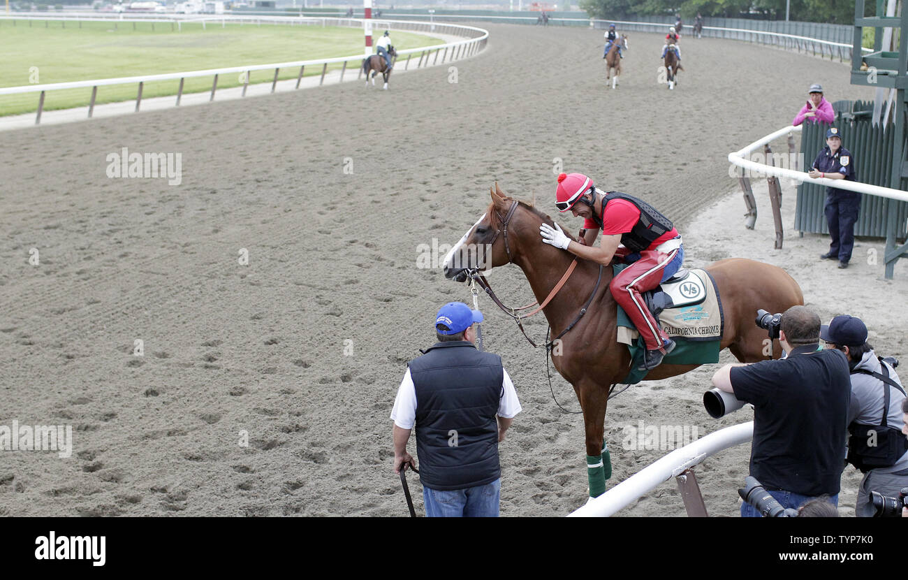 Exercise rider Willie Delgado and assistant trainer Alan Sherman stands ...