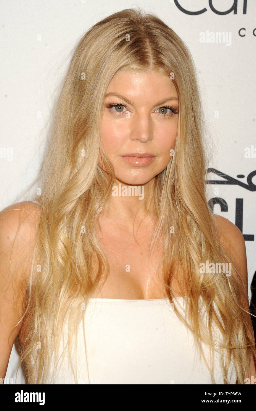 Fergie arrives on the red carpet at amfAR's 5th Annual Inspiration Gala ...