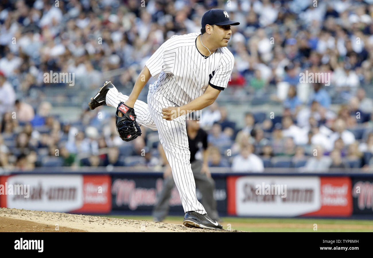 New York Yankees starting pitcher Vidal Nuno throws a pitch in the ...