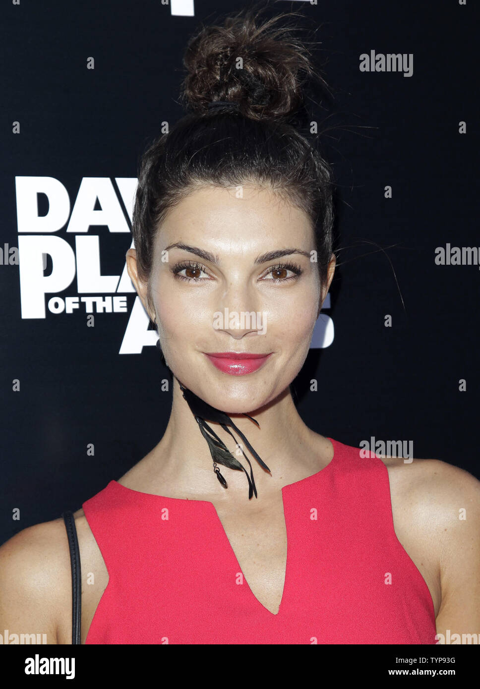 Teresa Moore arrives on the red carpet at the 'Dawn Of The Planets Of ...