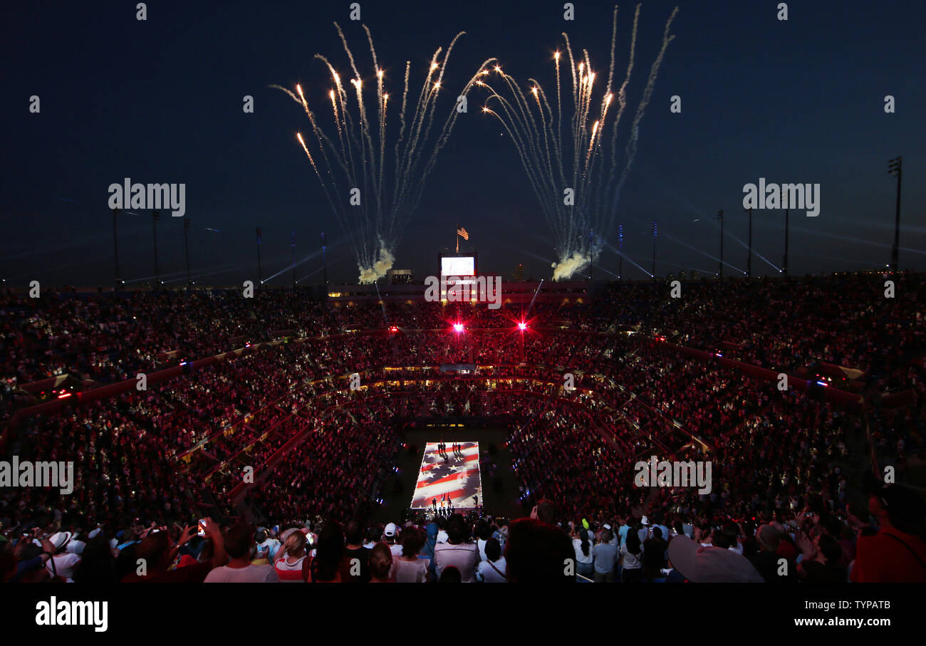 Fireworks go off in Arthur Ashe Stadium for opening night ceremonies at ...