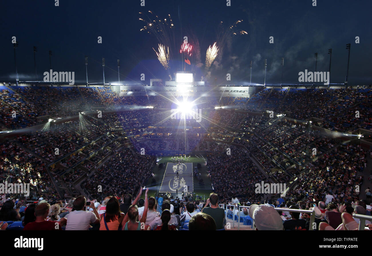 Fireworks go off in Arthur Ashe Stadium for opening night ceremonies at ...