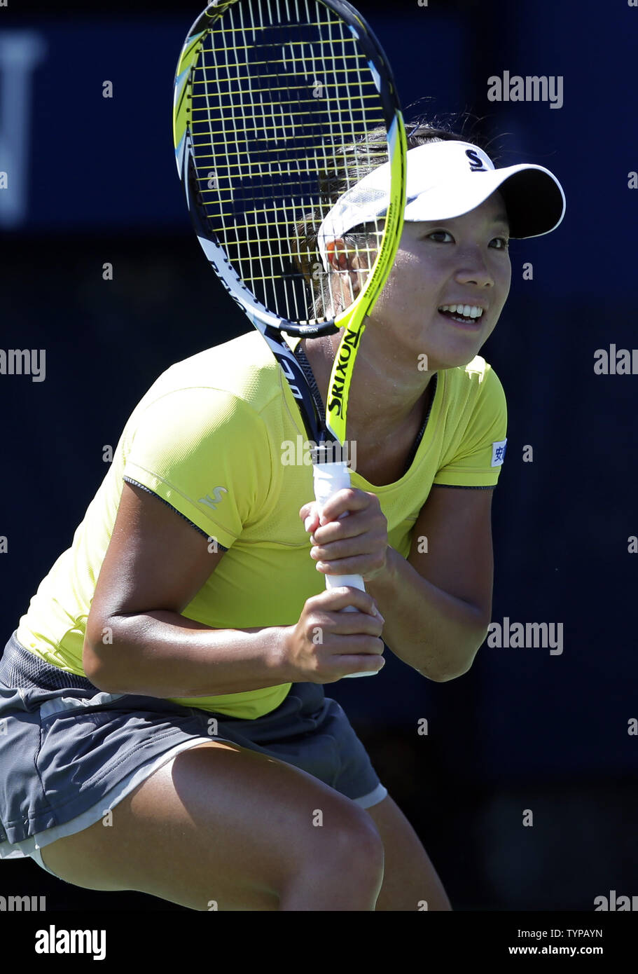 Kurumi Nara of Japan smiles after hitting a backhand to Belinda Bencic ...
