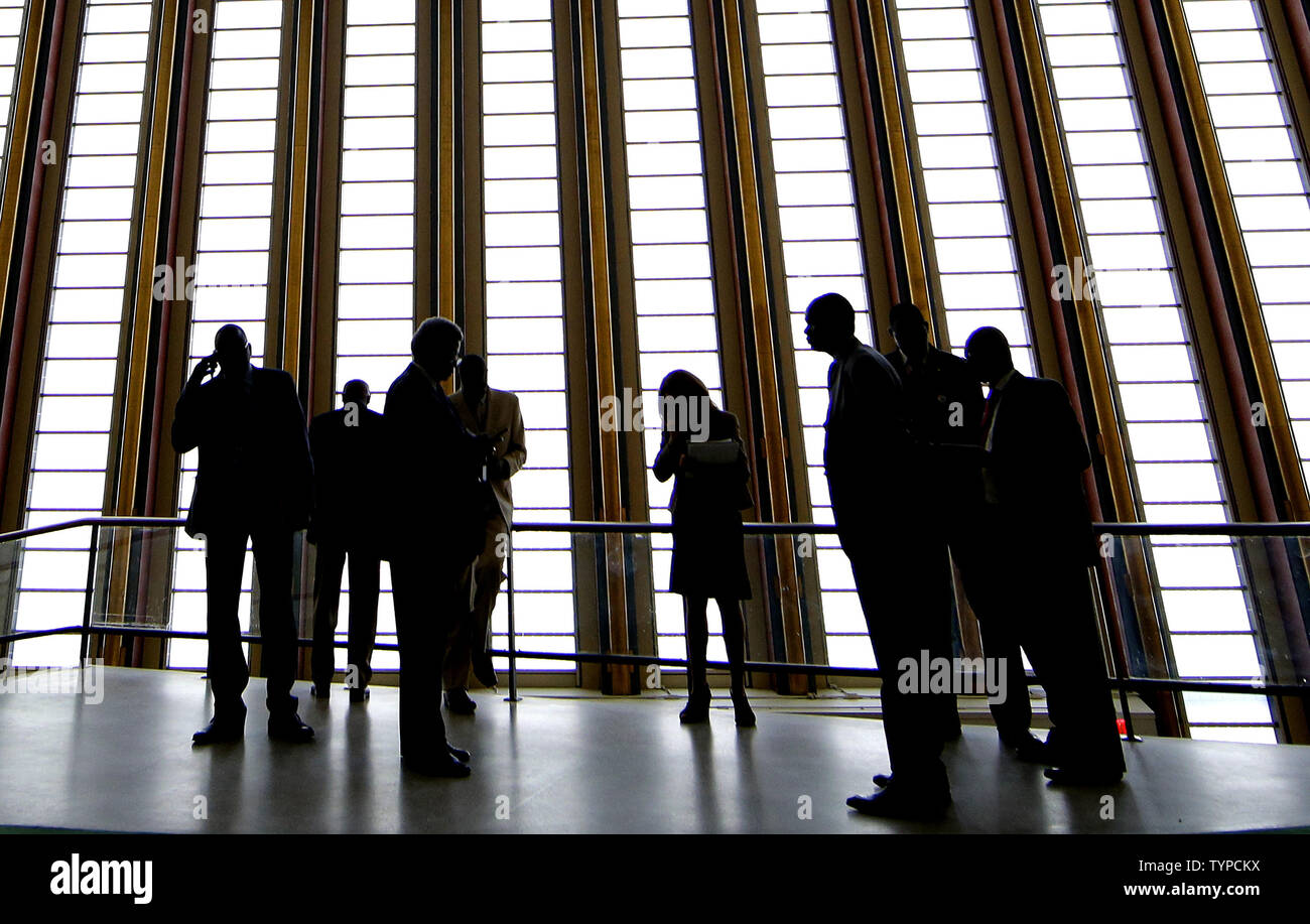 People gather outside the doors of newly renovated General Assembly ...