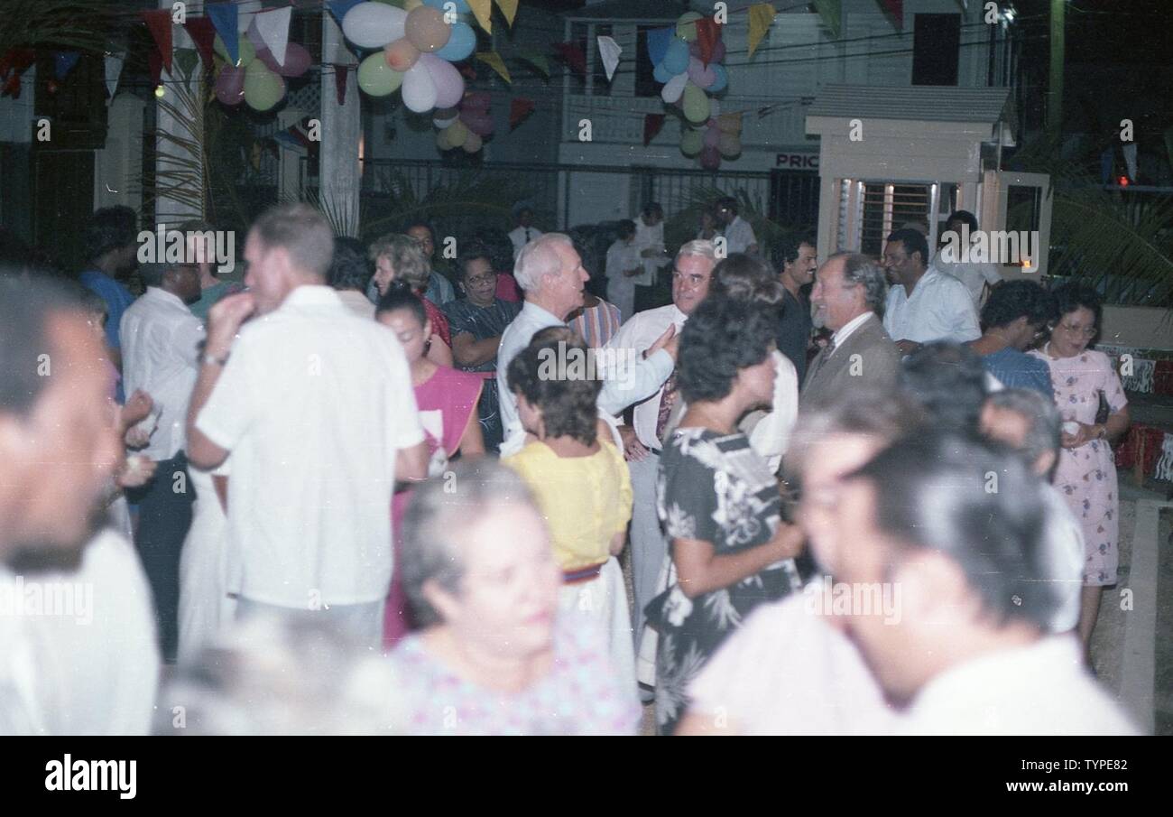 Group of people mingling together with one another hi-res stock ...