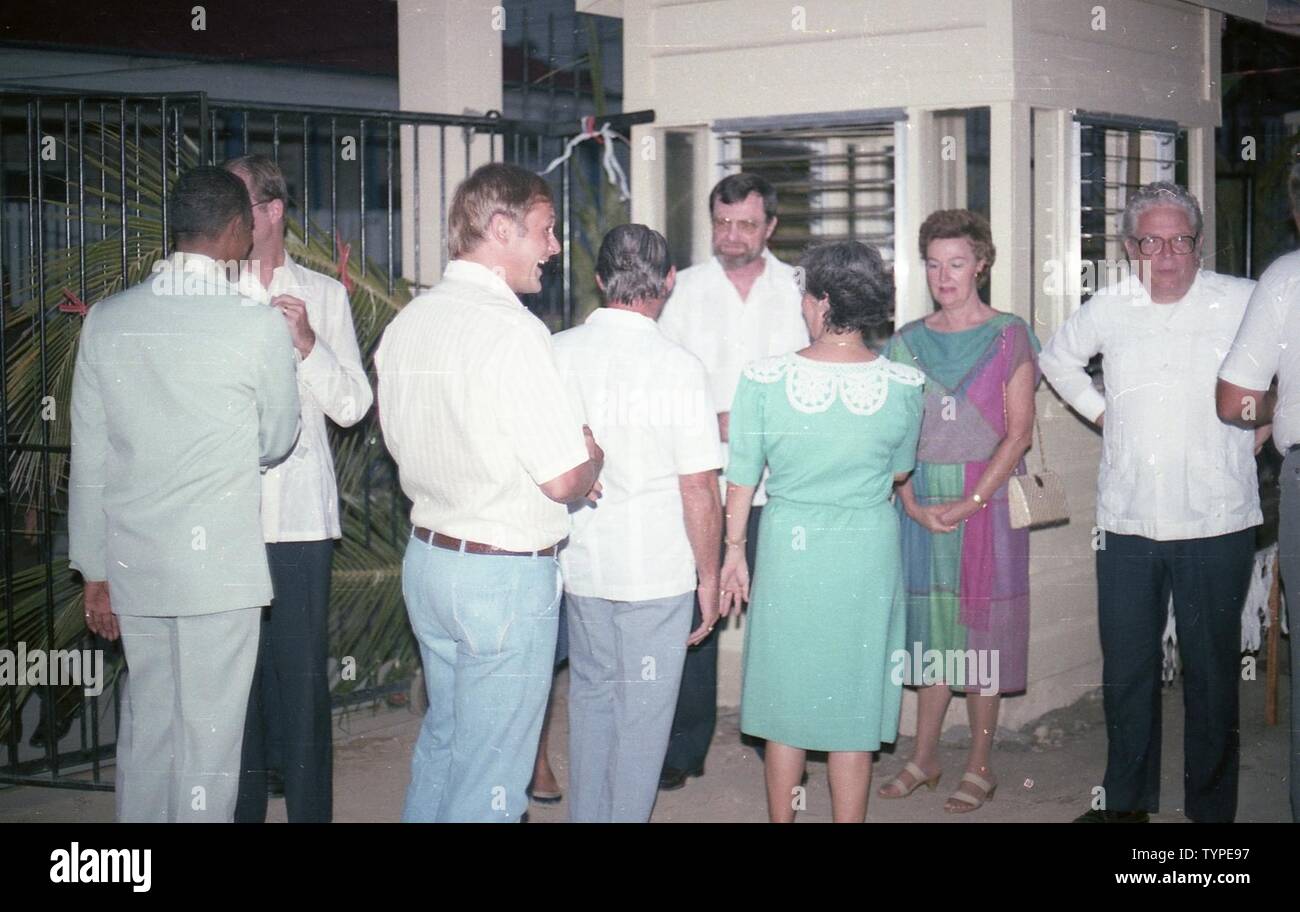 Group of people mingling together with one another hi-res stock ...