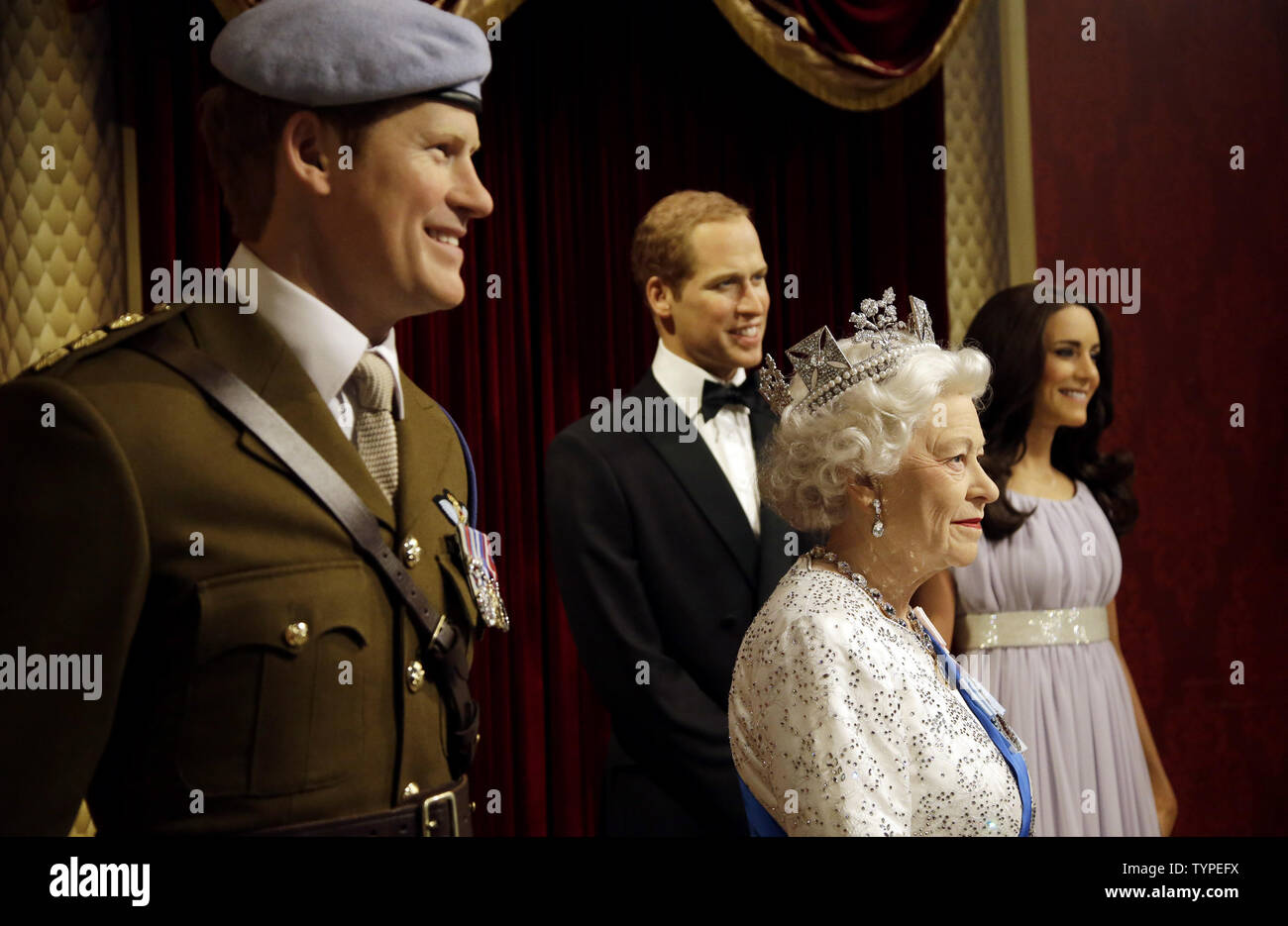 Wax figures of Prince Harry, Queen Elizabeth, Prince William and ...