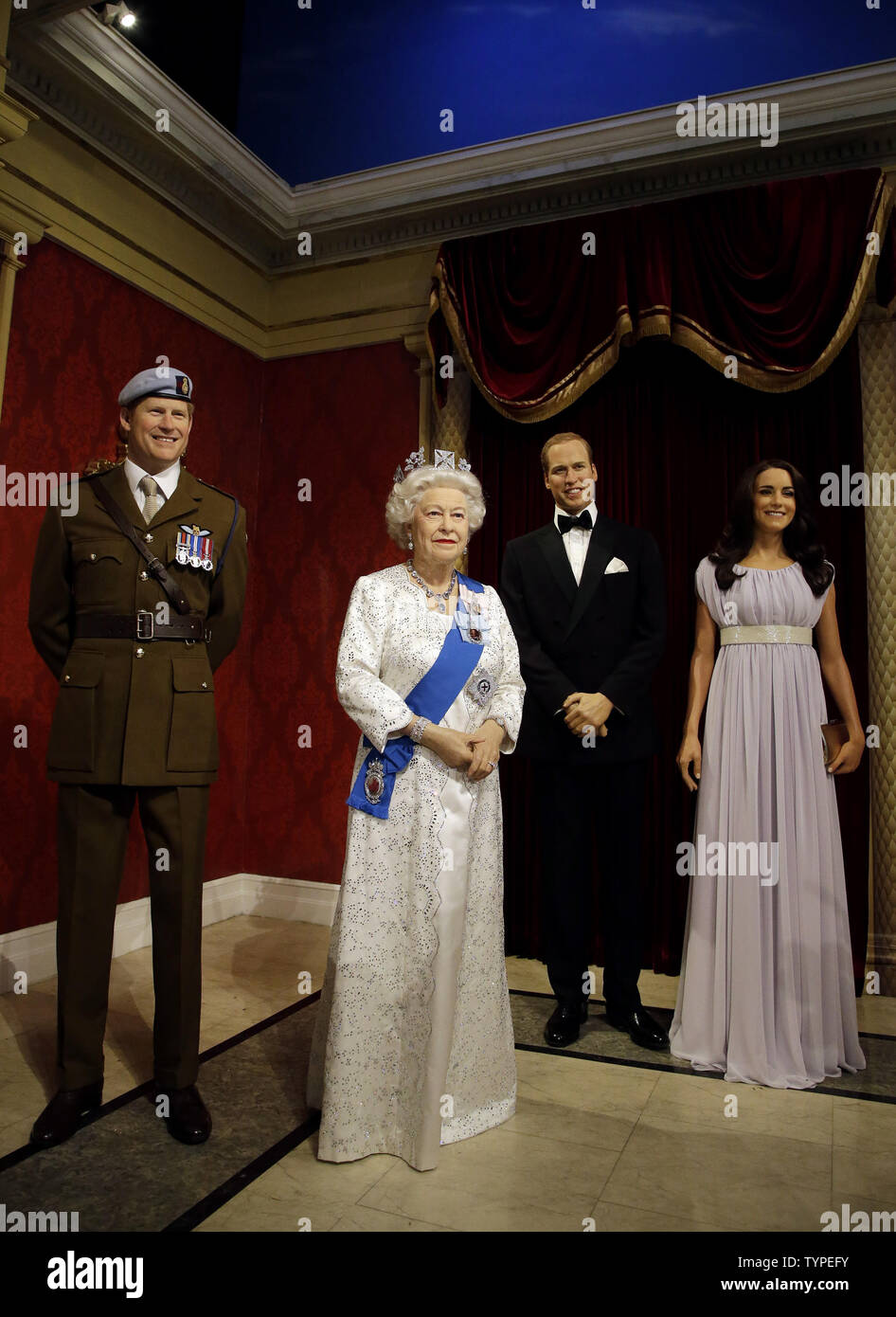 Wax figures of Prince Harry, Queen Elizabeth, Prince William and ...