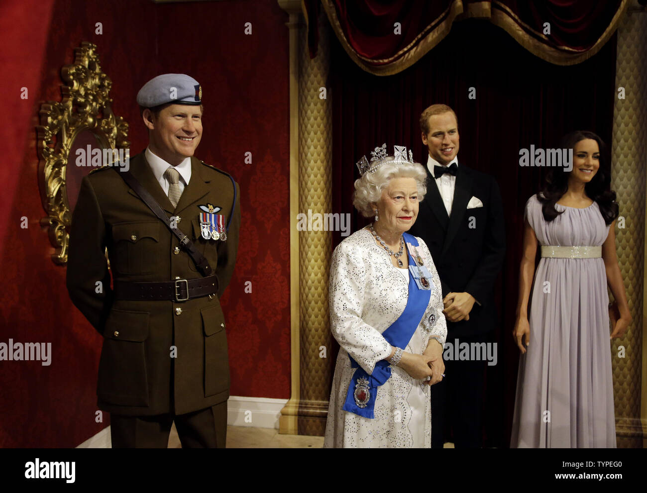 Wax figures of Prince Harry, Queen Elizabeth, Prince William and ...