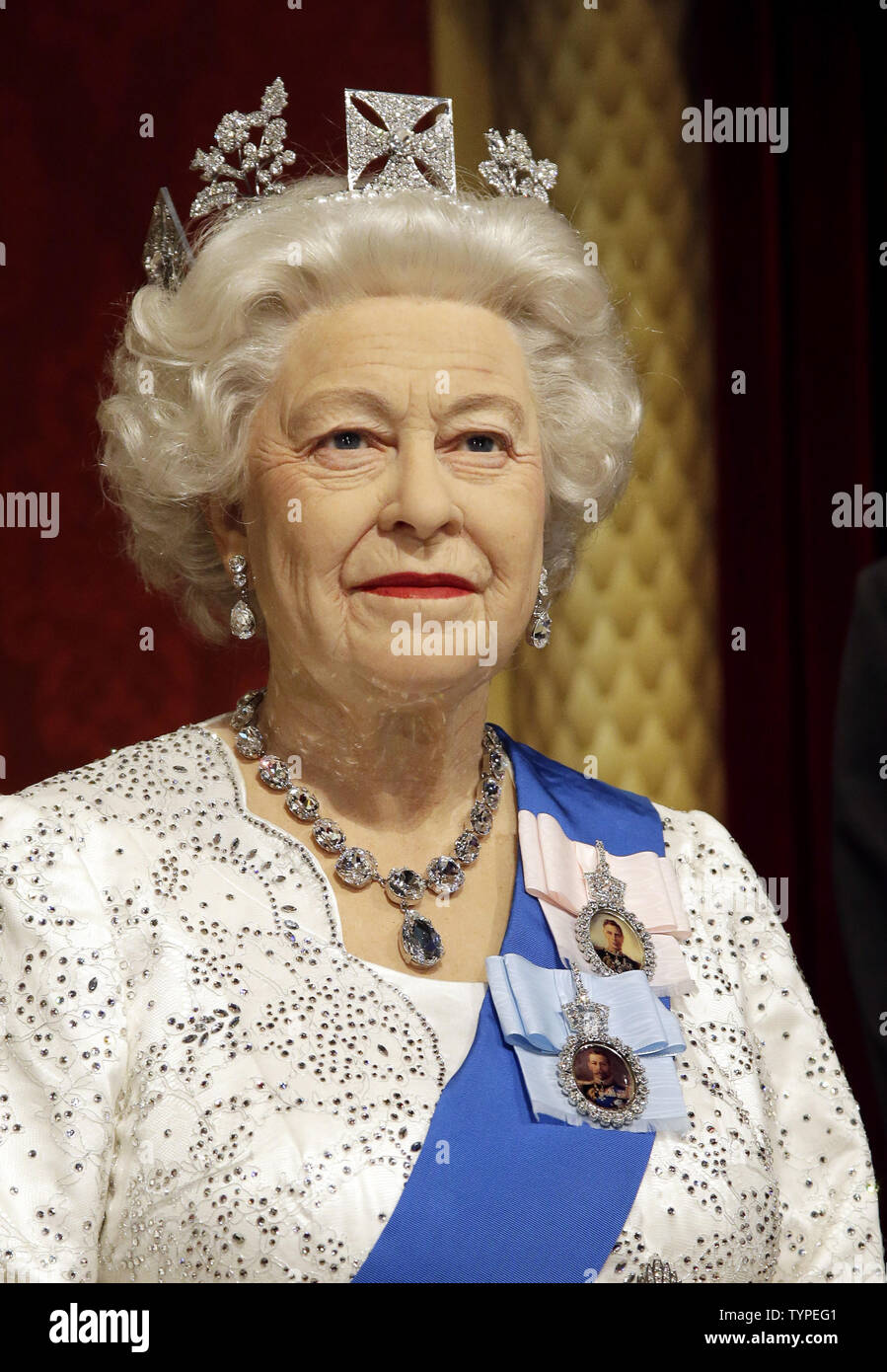 A Wax figure of Queen Elizabeth seen here along with Prince William ...