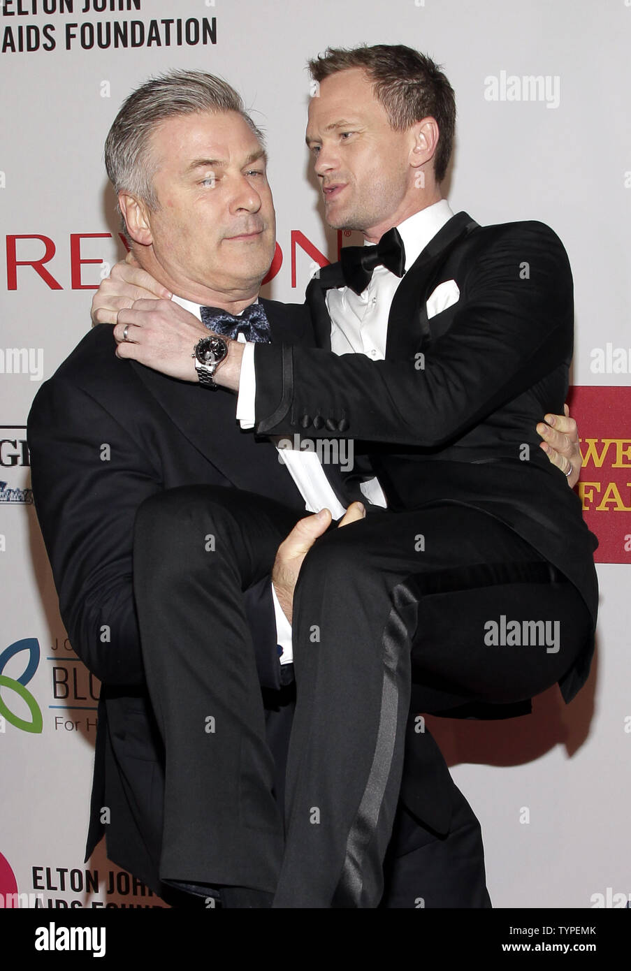 Alec Baldwin and Neil Patrick Harris arrive on the red carpet at the ...