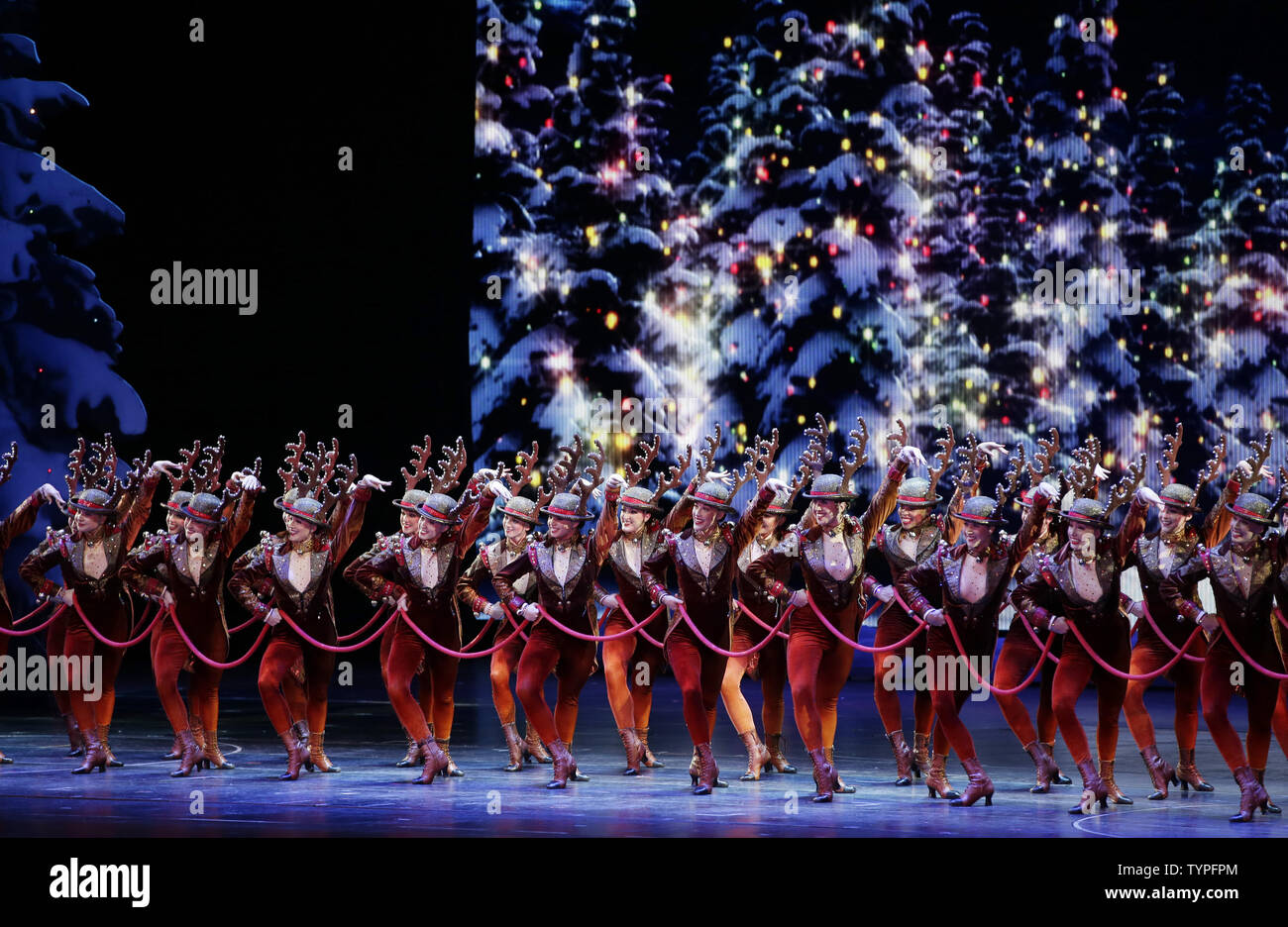 The Rockettes dance on stage at the Opening Performance of the Radio ...