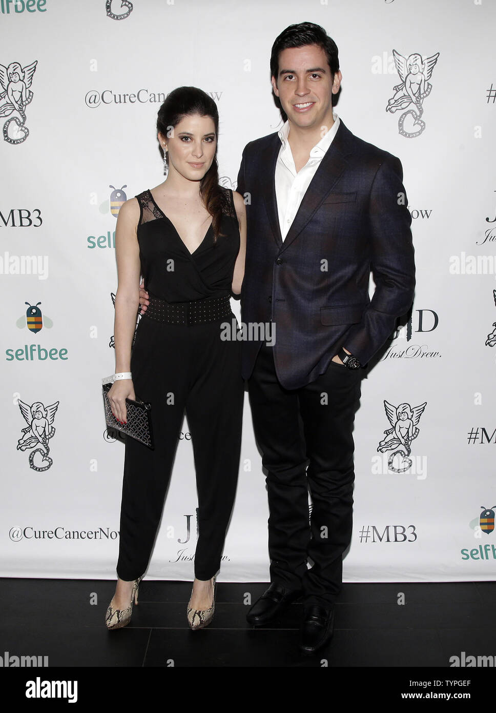 Roberto Quiroz and Mireya Rios arrive on the red carpet at the 2014 ...