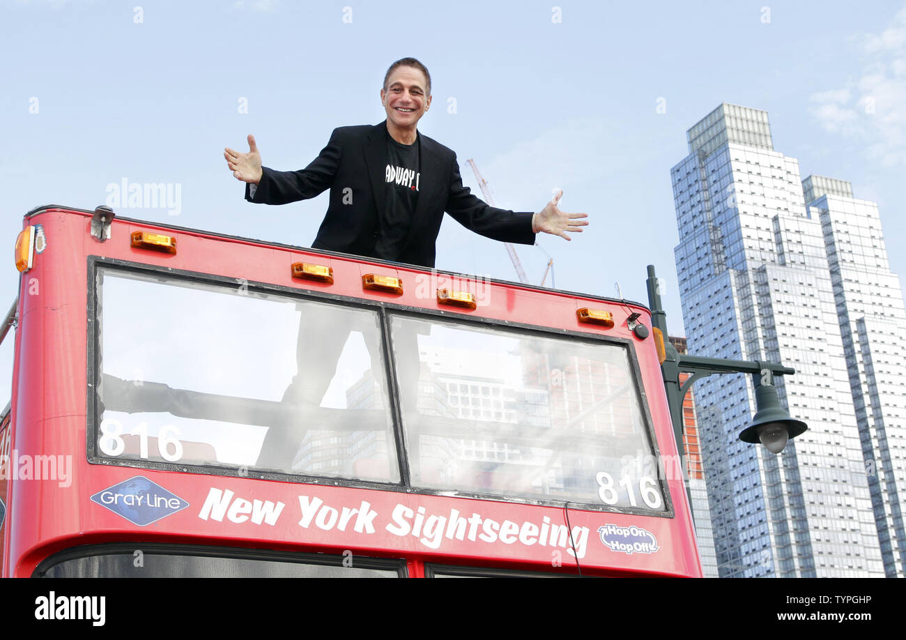 Tony Danza stands on the top deck of the bus when he is honored with a ...