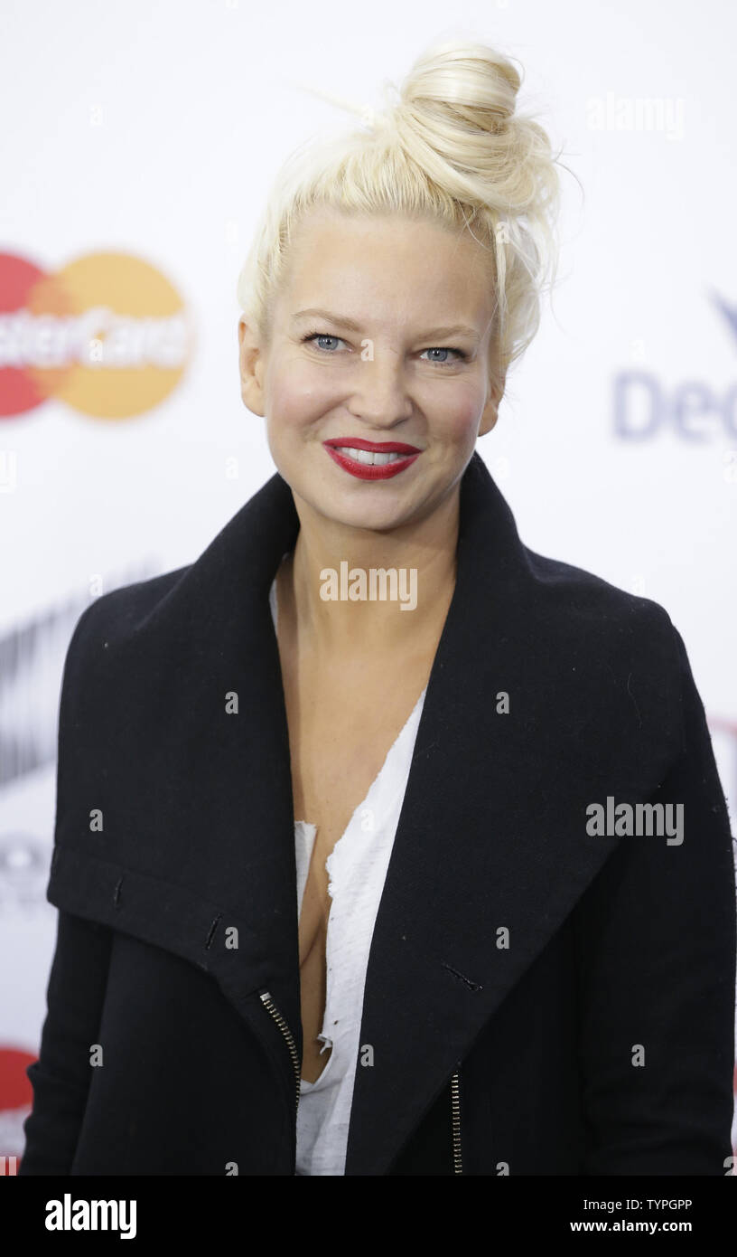 Sia arrives on the red carpet at the 'Annie' World Premiere at the ...