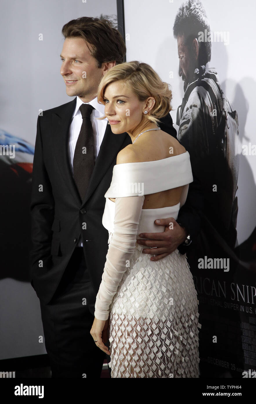 Sienna Miller and Bradley Cooper arrive on the red carpet at the ...