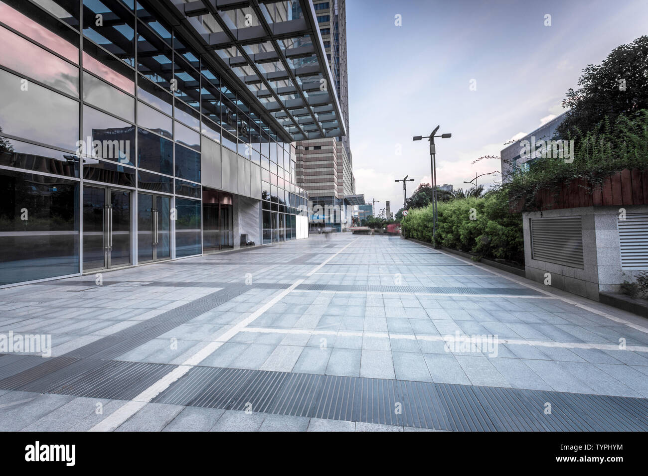 Empty road near modern building Stock Photo - Alamy