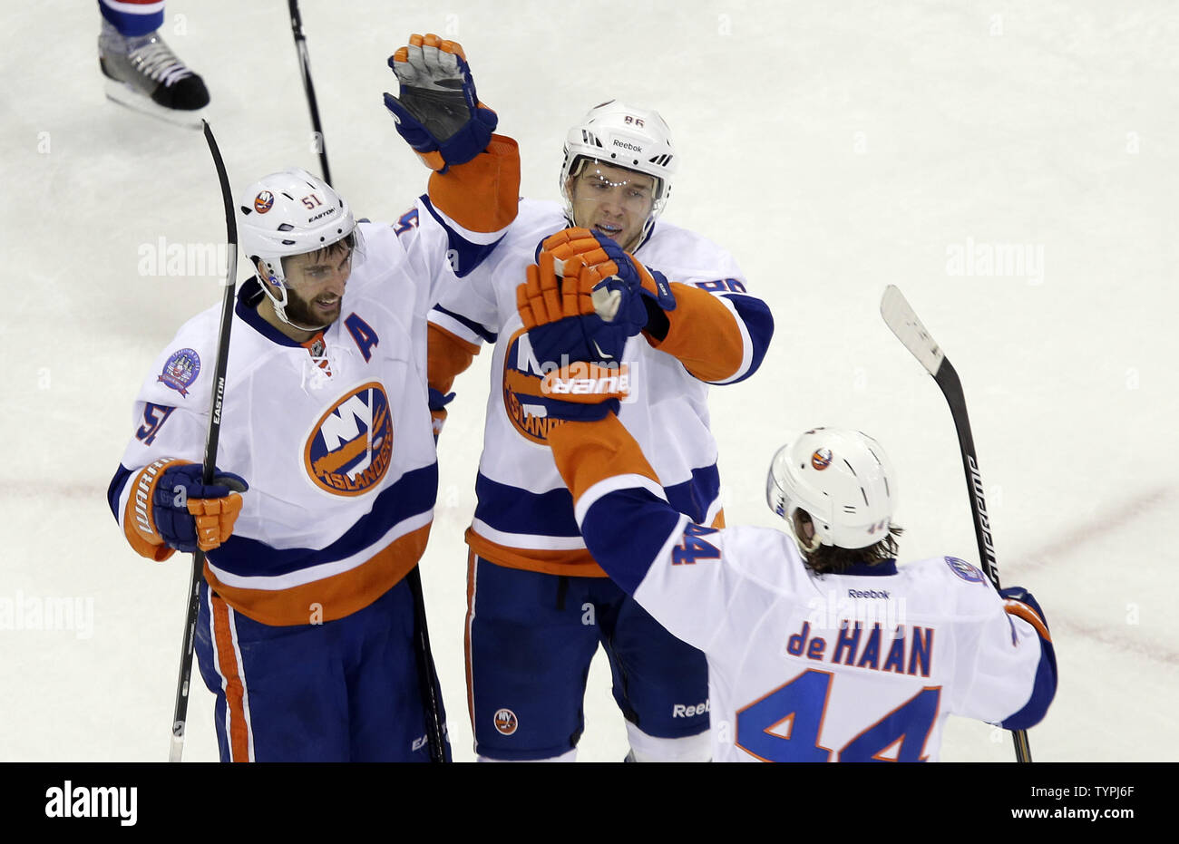 New York Islanders Nikolay Kulemin celebrates with Frans Nielsen and ...