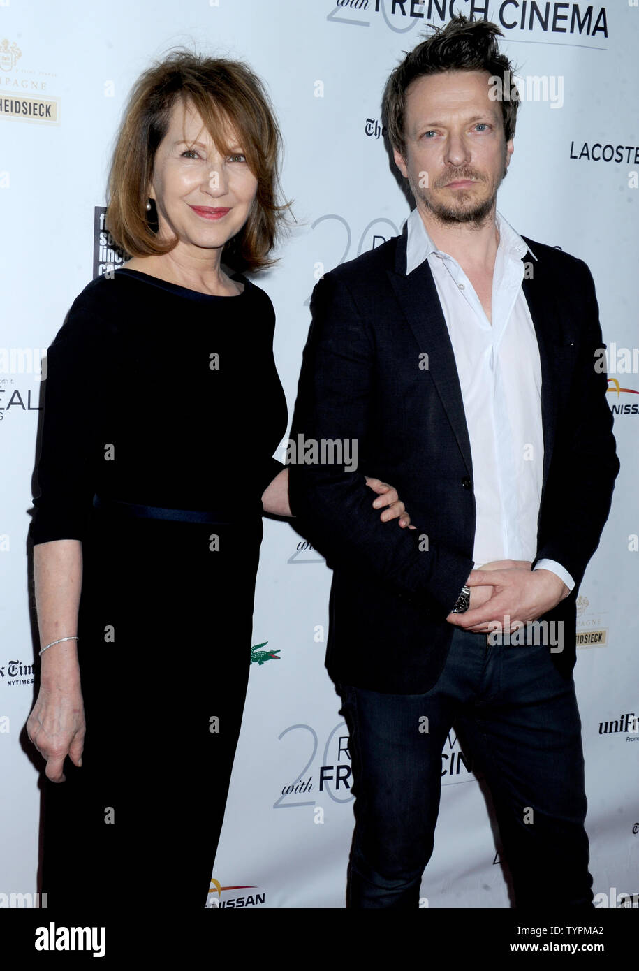 Nathalie Baye and Frederic Tellier arrive on the red carpet at the ...