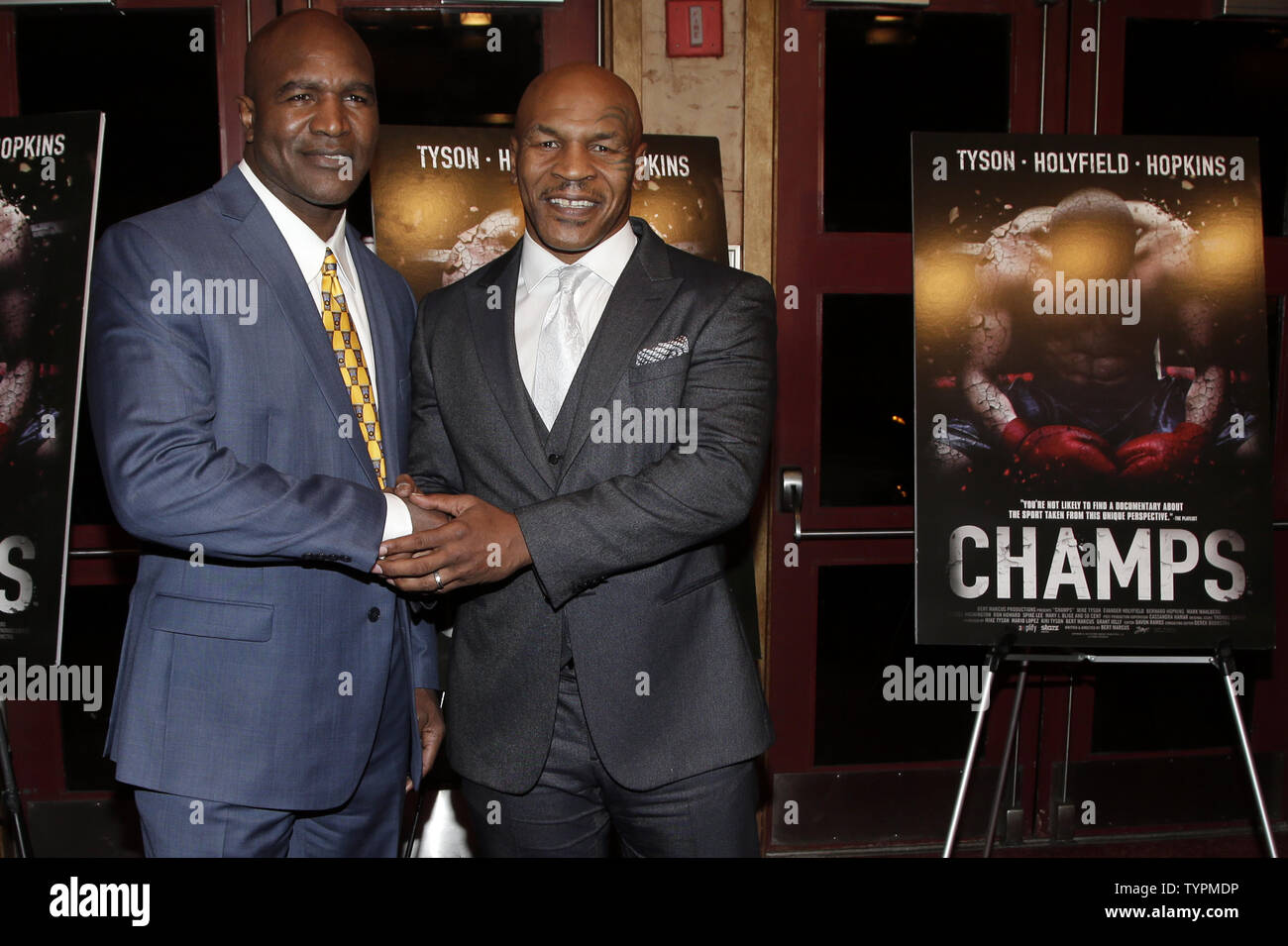 Mike Tyson and Evander Holyfield arrive on the red carpet at the ...
