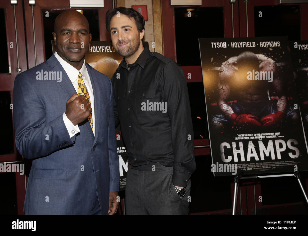 Evander Holyfield and director Bert Marcus arrive on the red carpet at ...