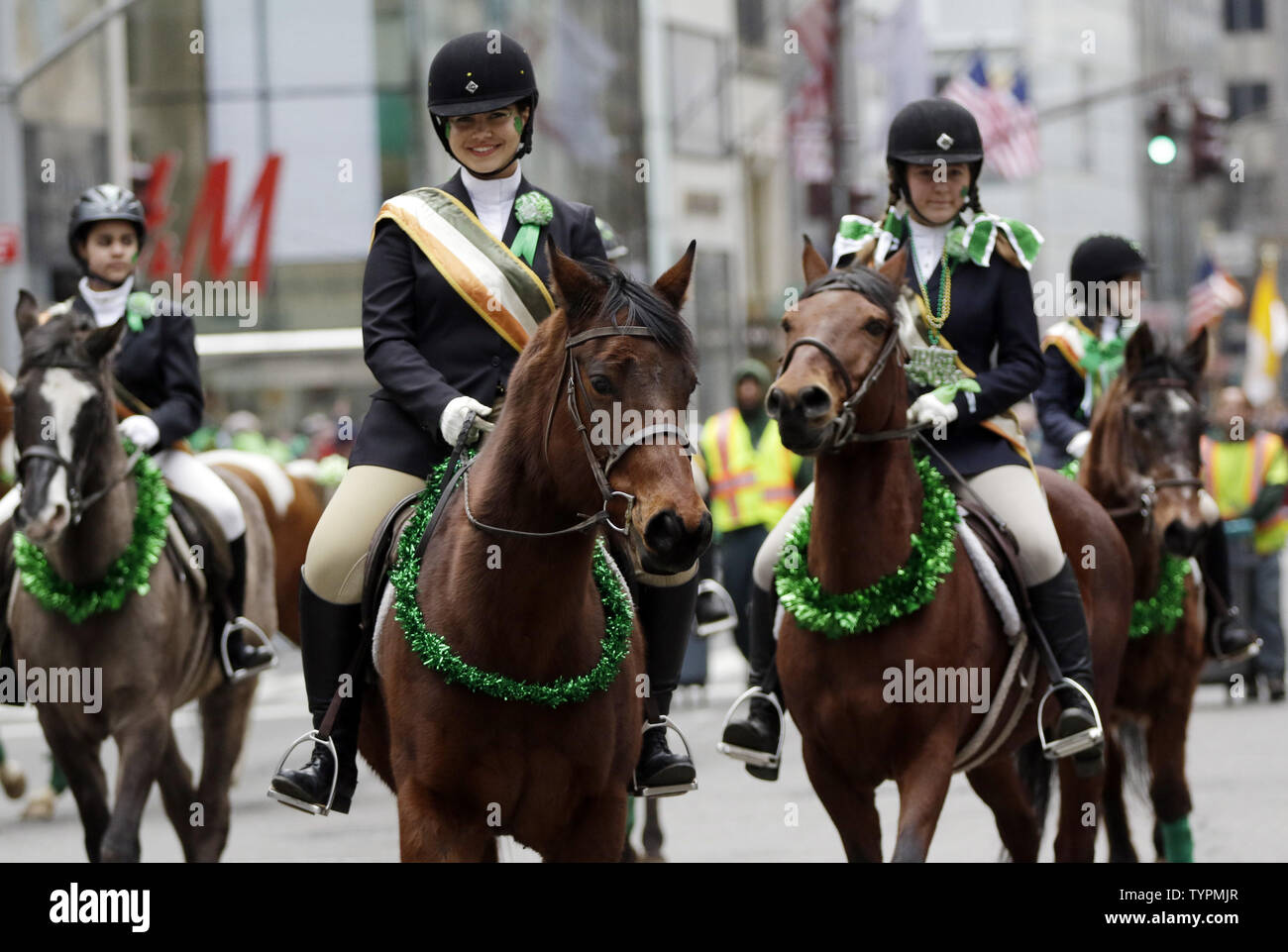 Horses walk on the parade route at the St. Patrick's Day Parade on ...