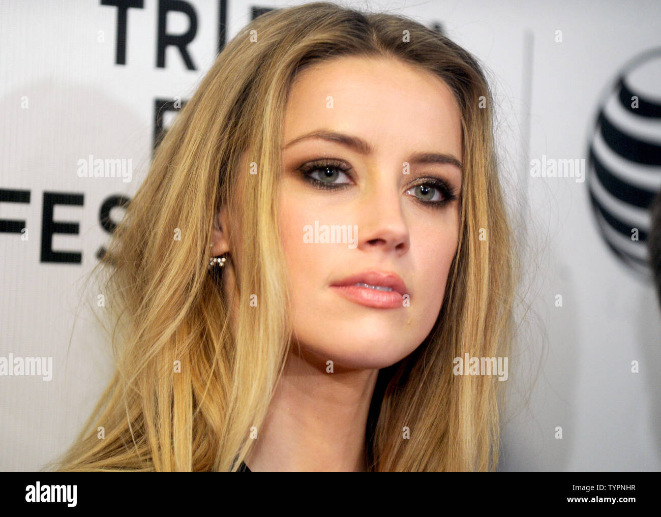 Amber Heard arrives on the red carpet at the premiere of 'The Adderall ...
