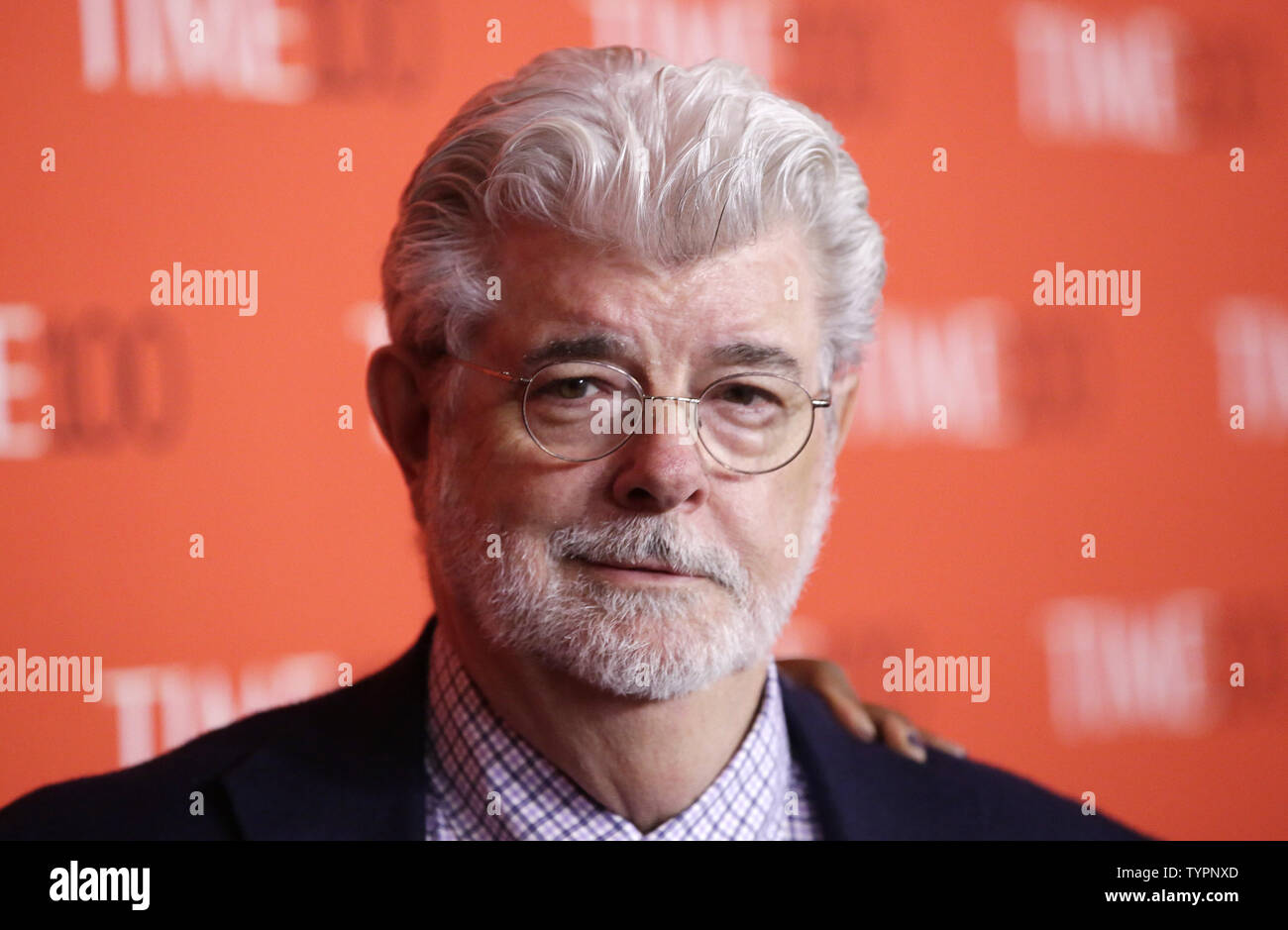 George Lucas arrives on the red carpet at the TIME 100 Gala at ...