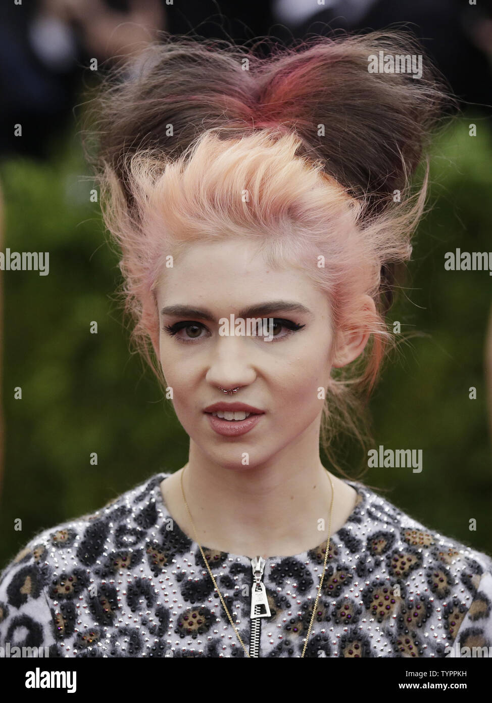 Grimes arrives on the red carpet at the Costume Institute Benefit at ...