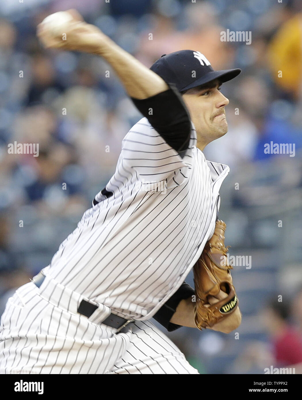 New York Yankees starting pitcher Nathan Eovaldi throws a pitch in the ...