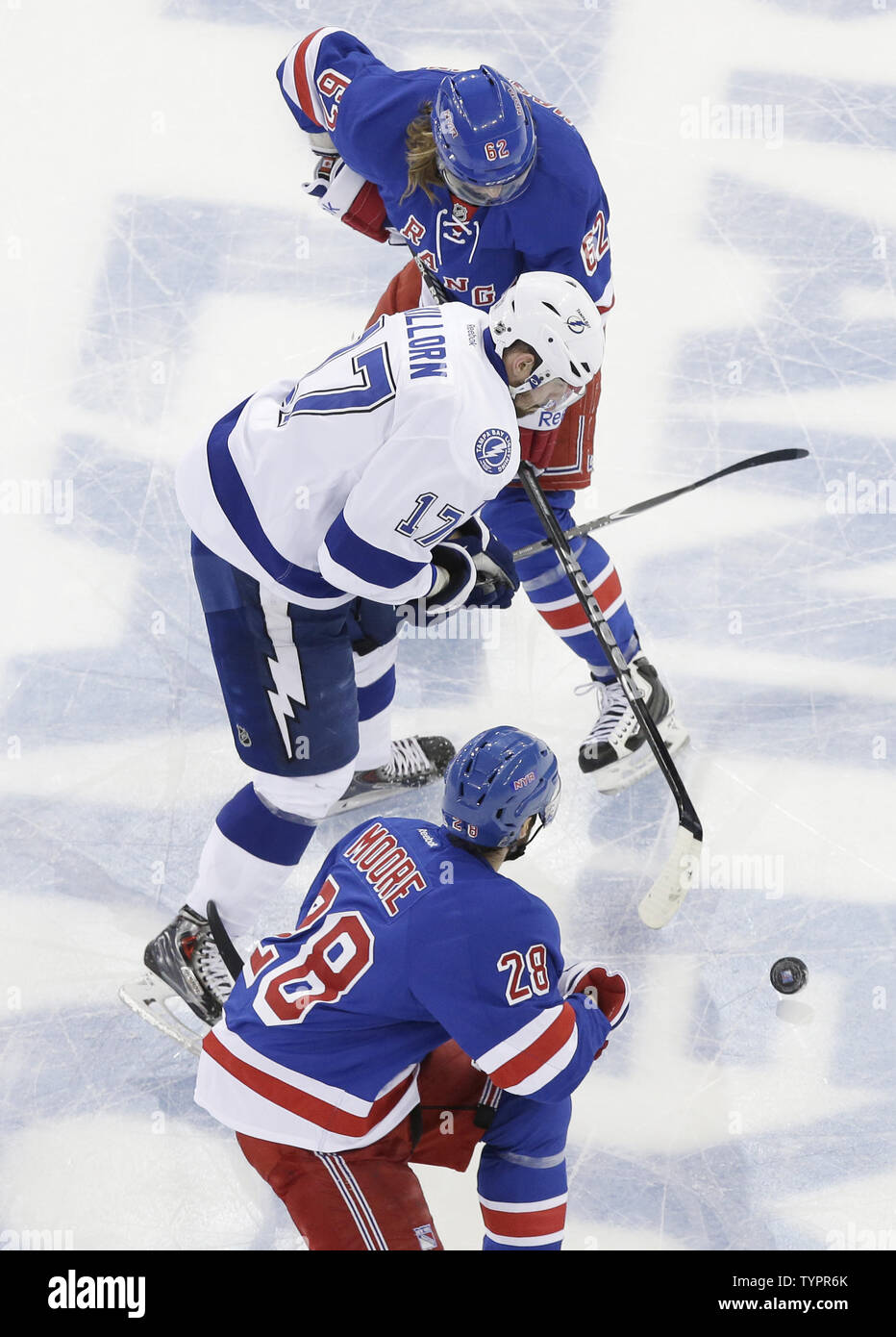 Tampa Bay Lightning Alex Killorn skates between New York Rangers ...