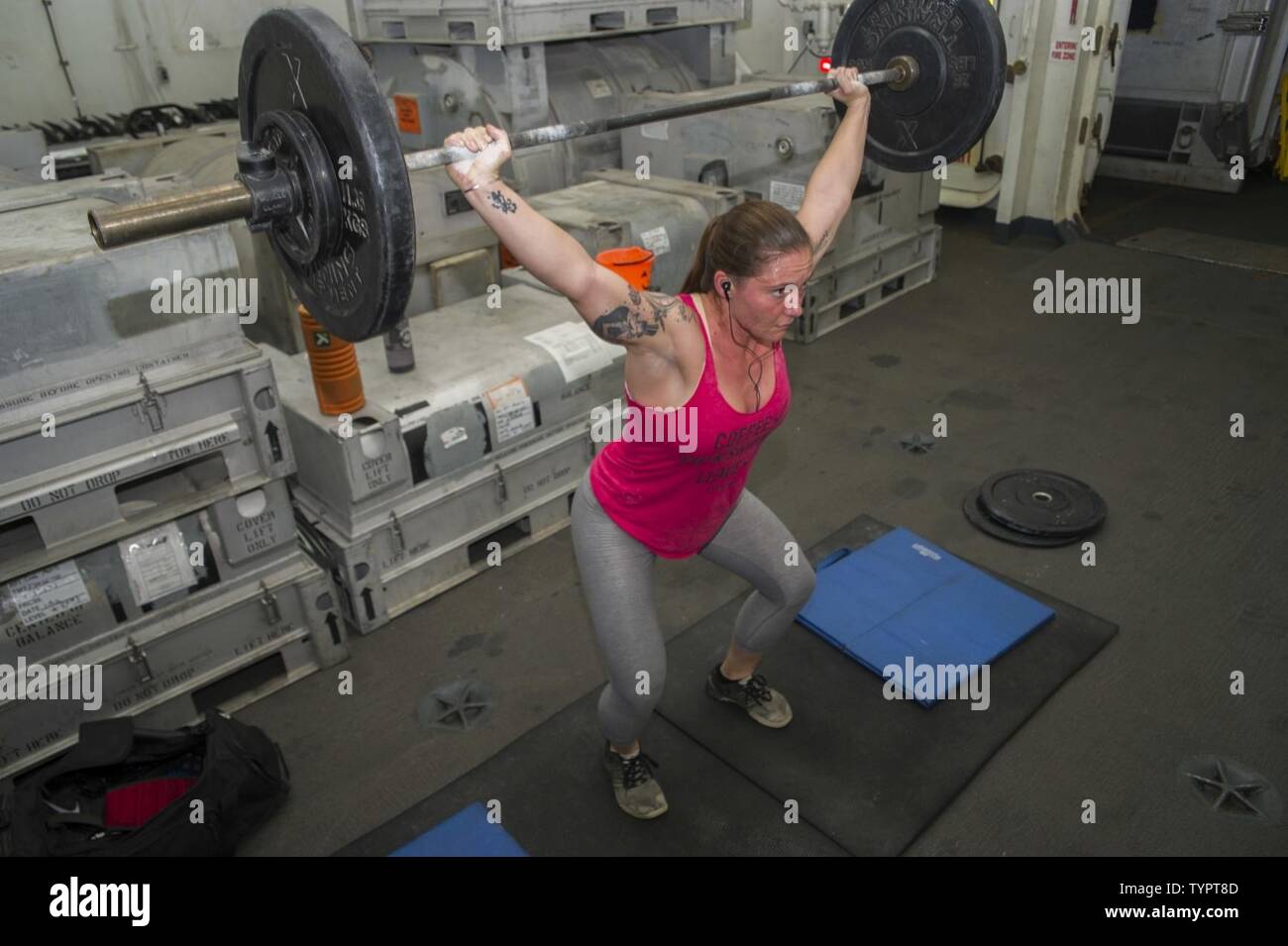 GULF (Nov. 21, 2016) Petty Officer 1st Class Corinna Benz lefts weights ...