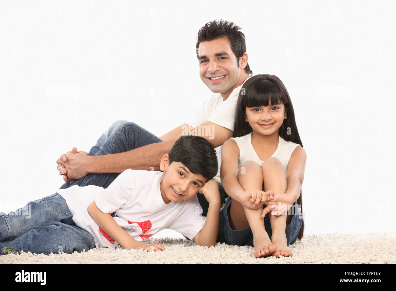 Portrait of a family smiling Stock Photo - Alamy