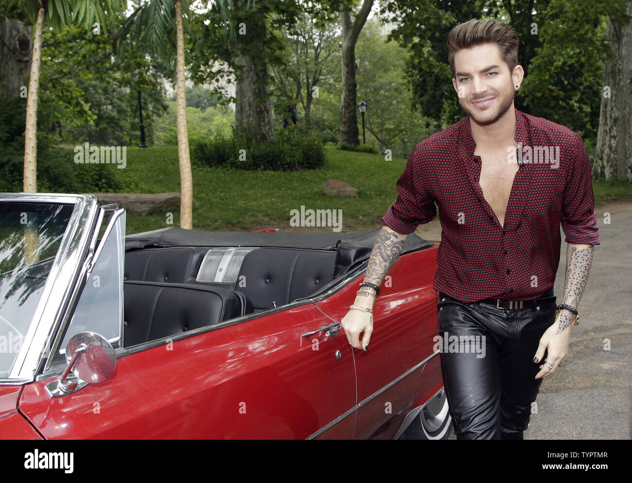 Adam Lambert walks to the stage to perform on the Good Morning America ...