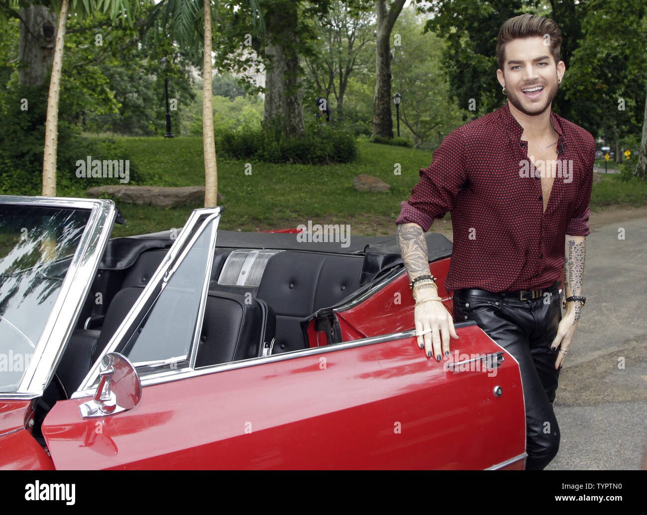 Adam Lambert walks to the stage to perform on the Good Morning America ...