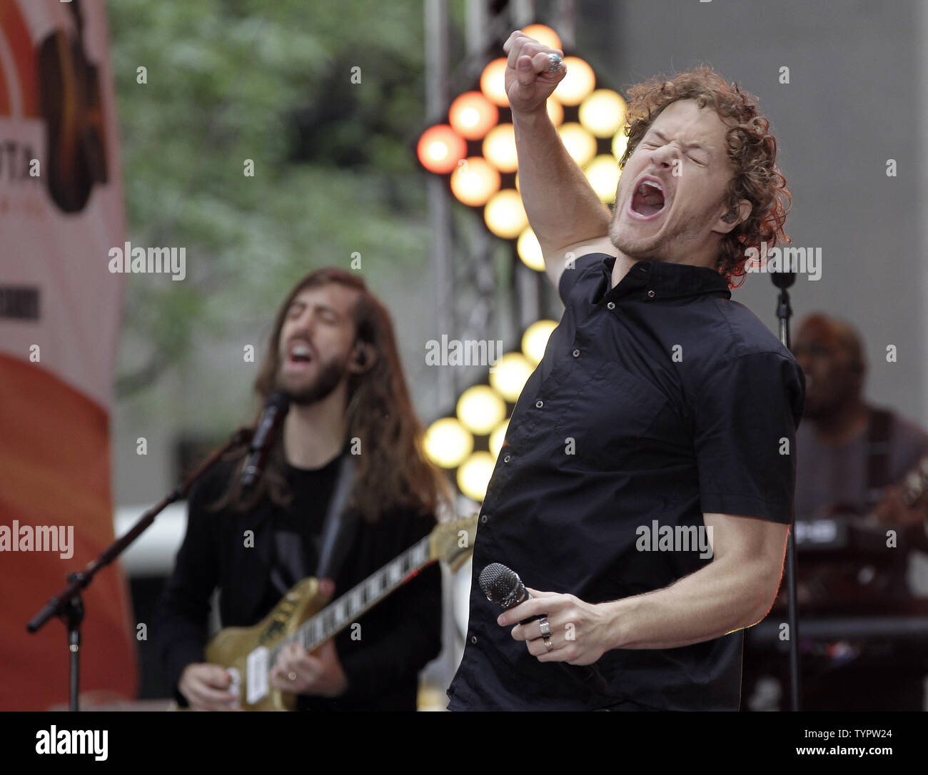 Dan Reynolds and Daniel Wayne Sermon perform with Imagine Dragons ...