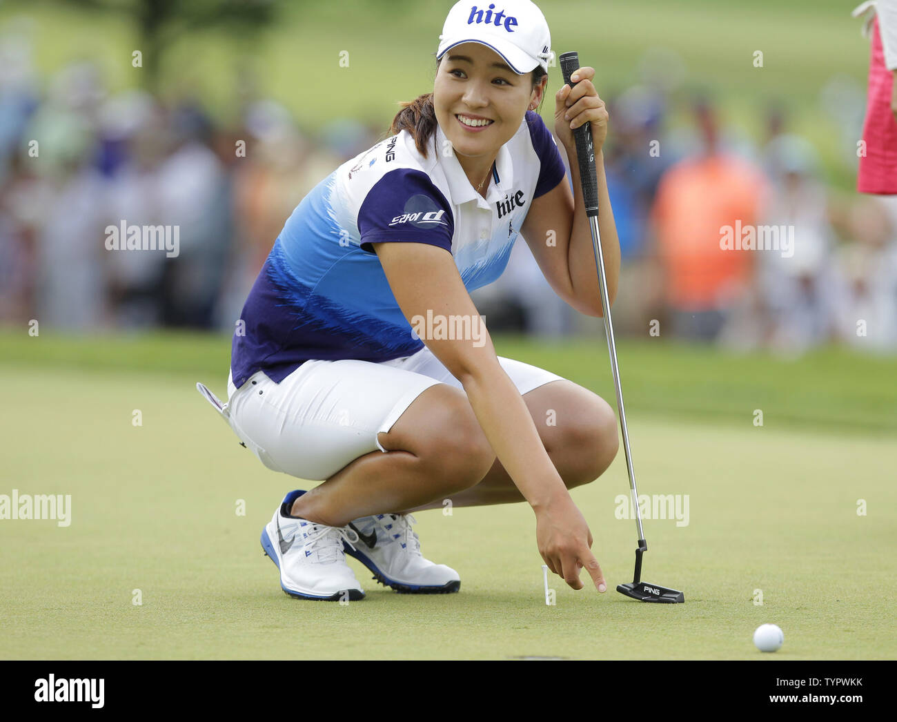In Gee Chun of Korea waits for an officials ruling on the first hole ...